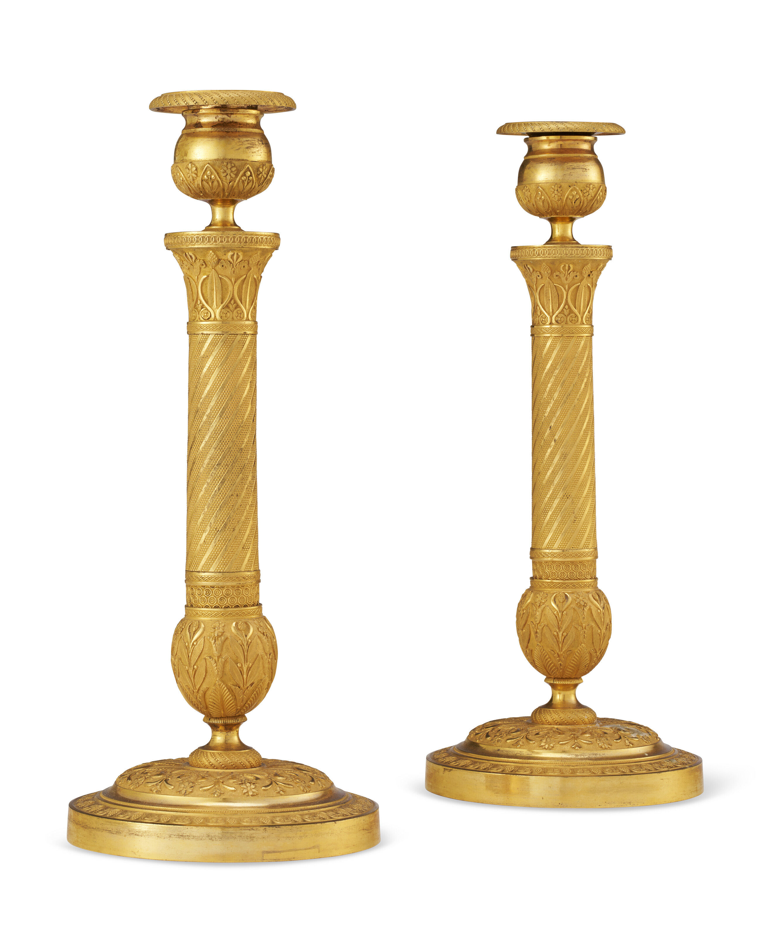 A PAIR OF RESTAURATION ORMOLU CANDLESTICKS, CIRCA 1820 | Christie’s