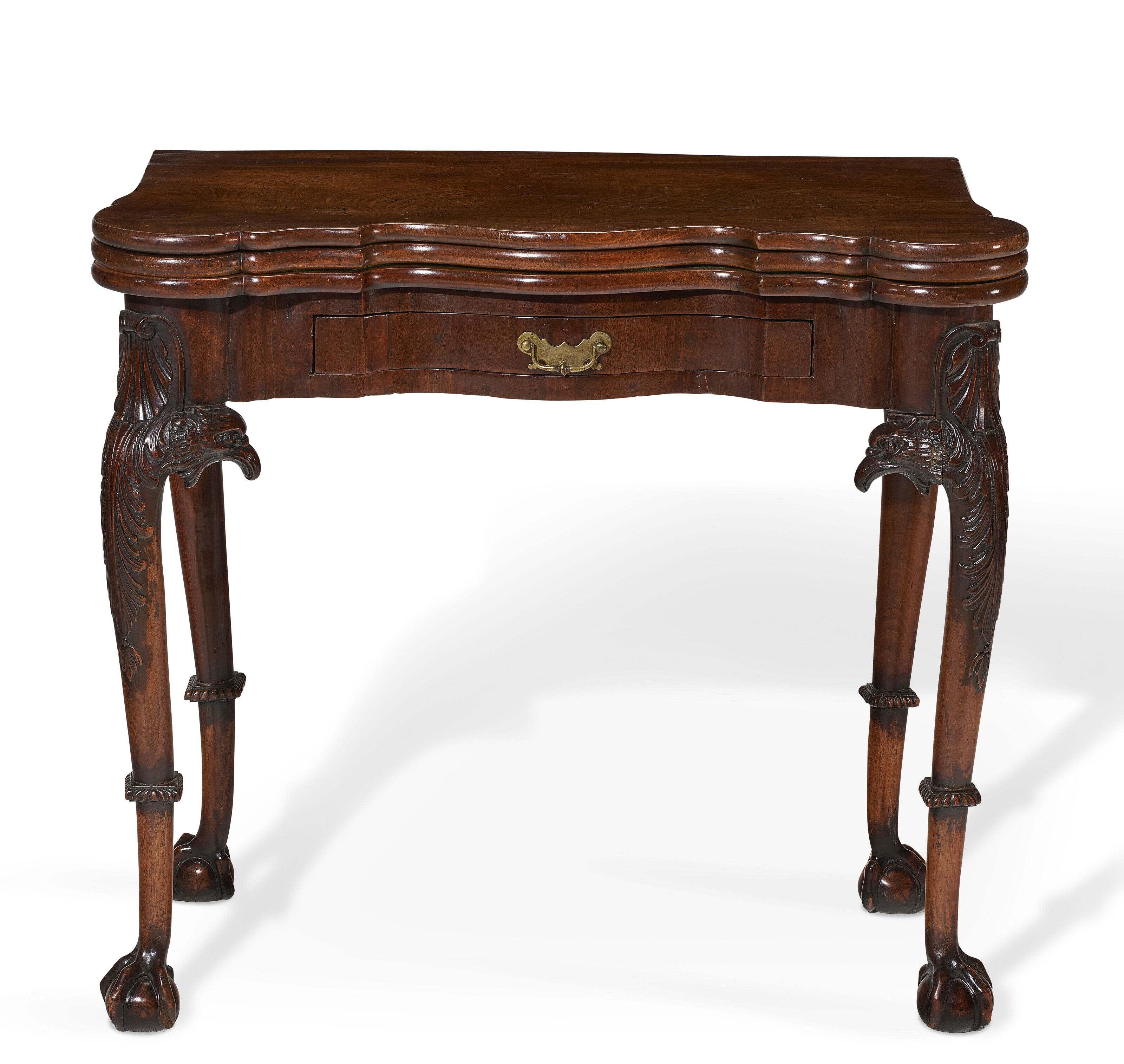 AN IRISH GEORGE II MAHOGANY TRIPLE-FOLDING GAMES TABLE, CIRCA 1745 ...
