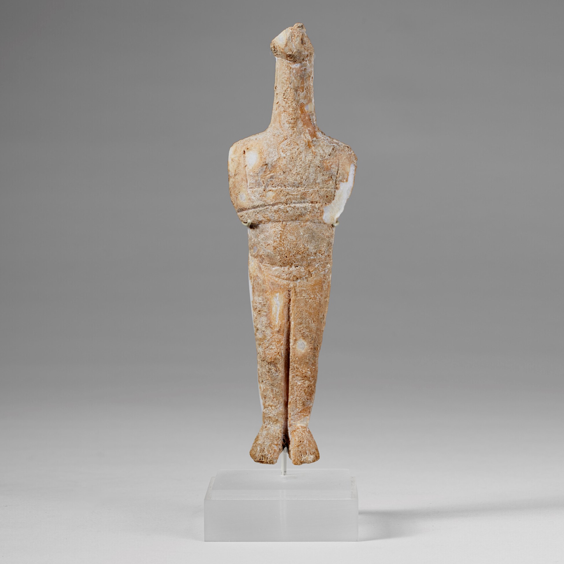 A CYCLADIC MARBLE FEMALE FIGURE, LATE SPEDOS TYPE, EARLY CYCLADIC II ...