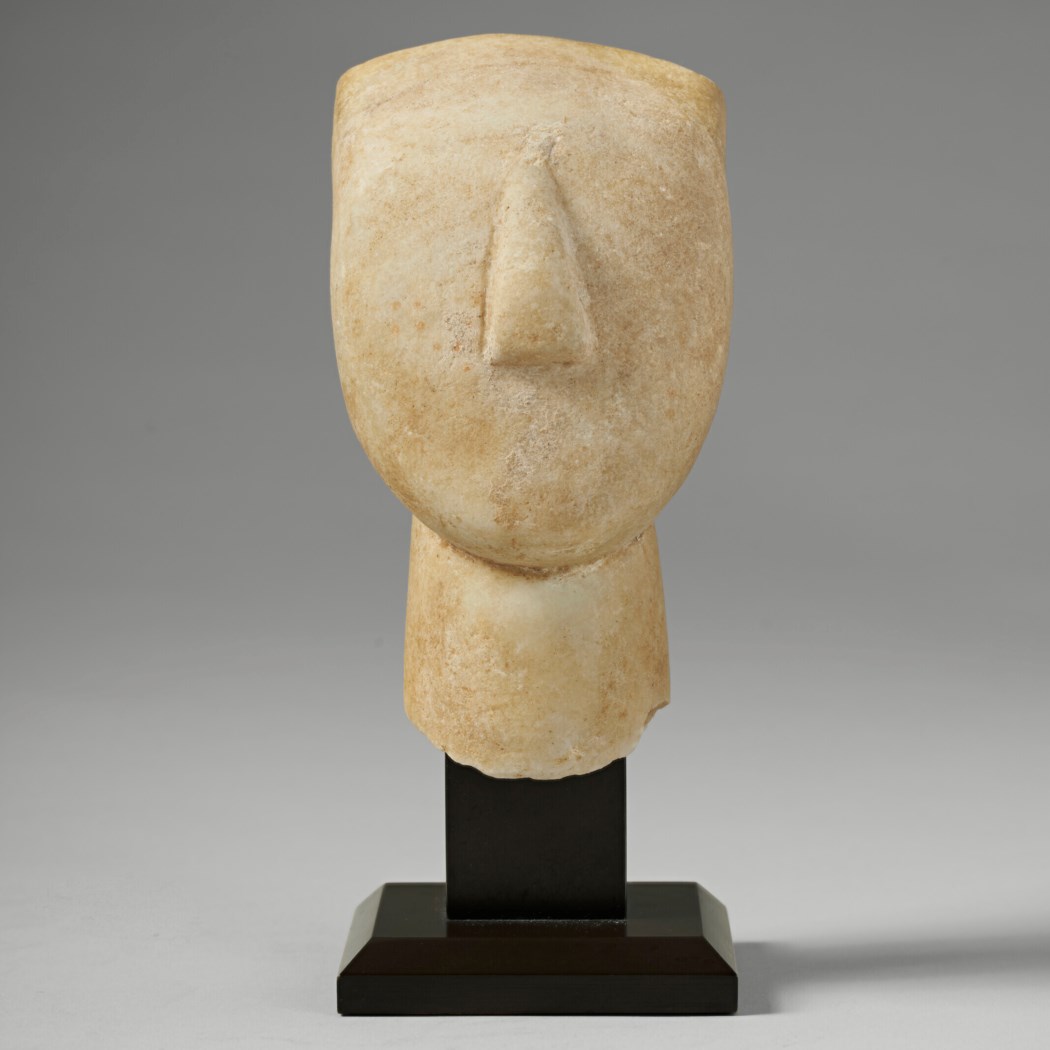 A CYCLADIC MARBLE HEAD, EARLY SPEDOS TYPE, EARLY CYCLADIC II, CIRCA ...