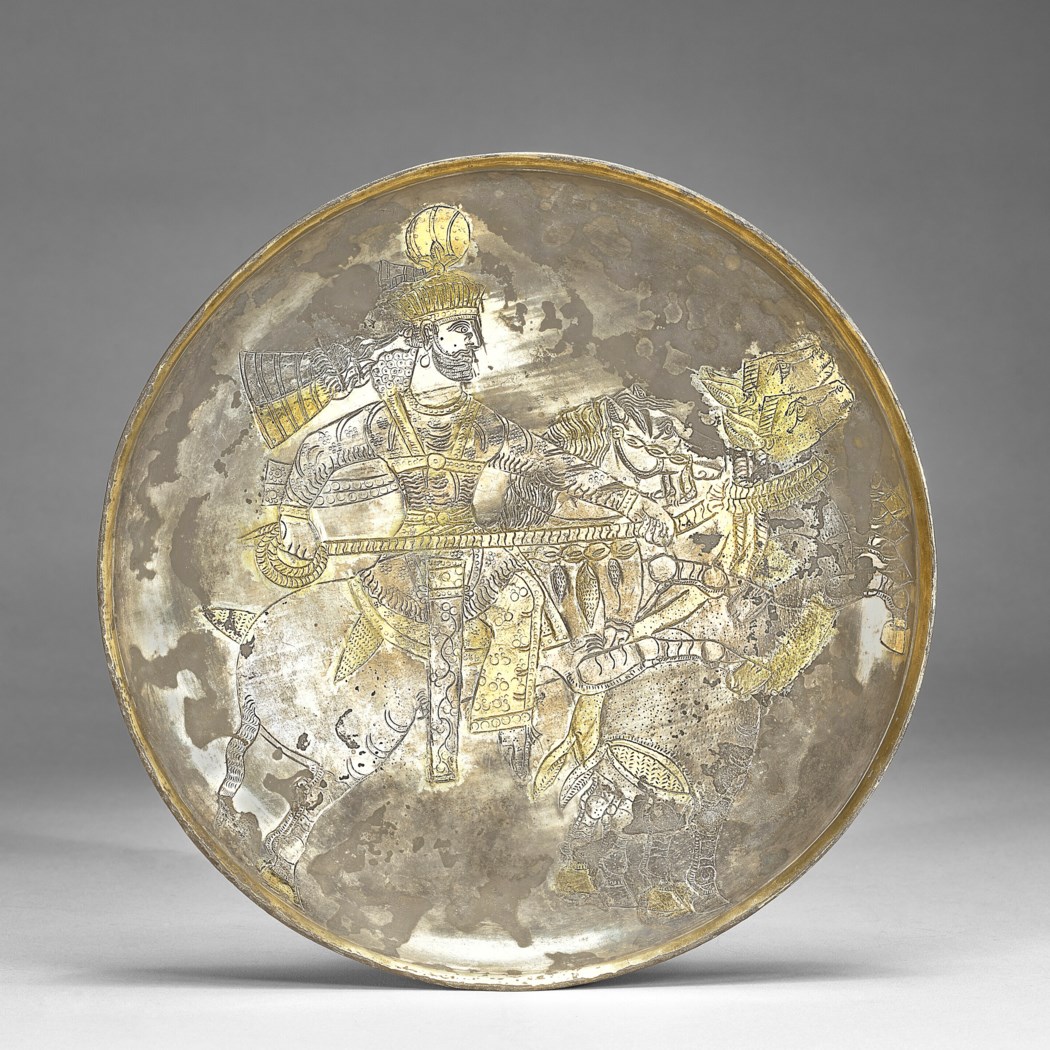 A SASANIAN PARCEL GILT SILVER FOOTED PLATE WITH NARSEH, CIRCA LATE 5TH ...