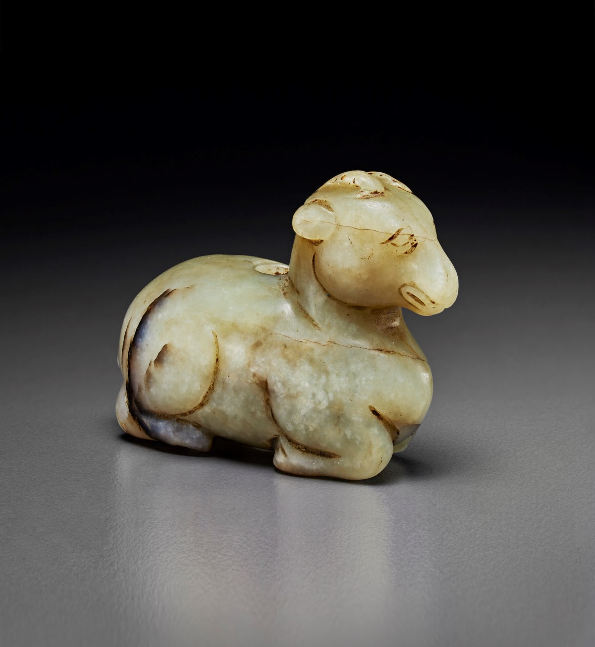 A GREYISH-GREEN AND BLACK JADE GOAT-FORM TOGGLE , TANG-SONG DYNASTY (AD ...