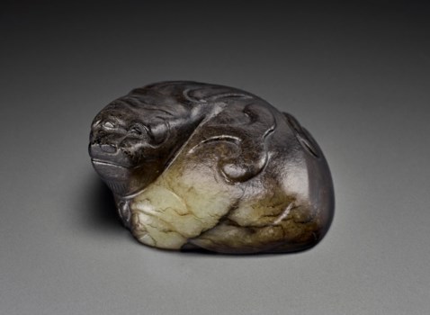 A BLACK AND GREENISH-GREY JADE FIGURE OF A MYTHICAL BEAST , MING ...