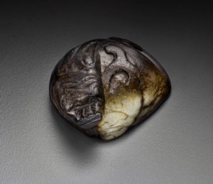 A BLACK AND GREENISH-GREY JADE FIGURE OF A MYTHICAL BEAST , MING ...