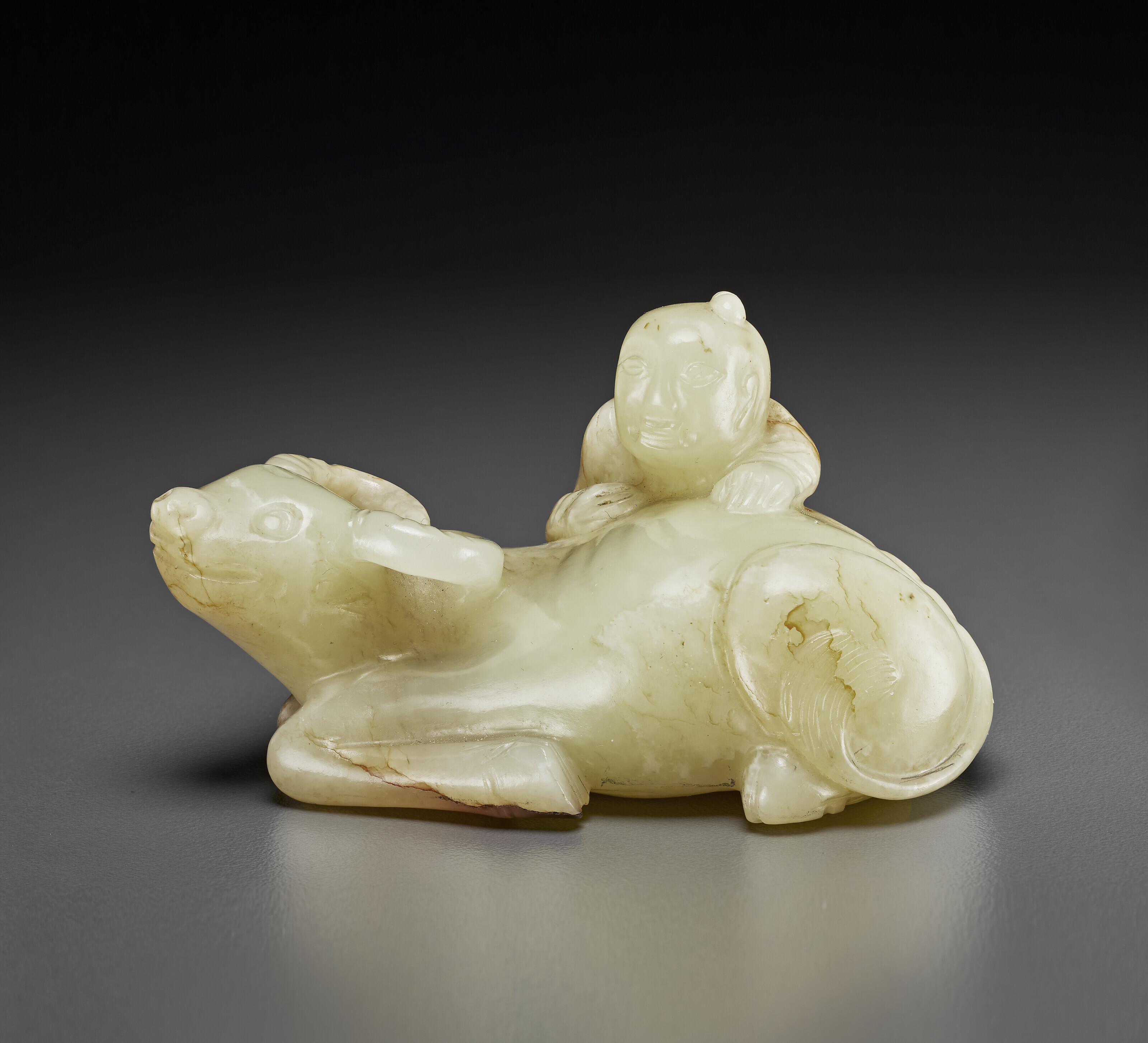 A YELLOW AND RUSSET JADE FIGURE OF A GOOSE, MING DYNASTY (1368-1644 ...