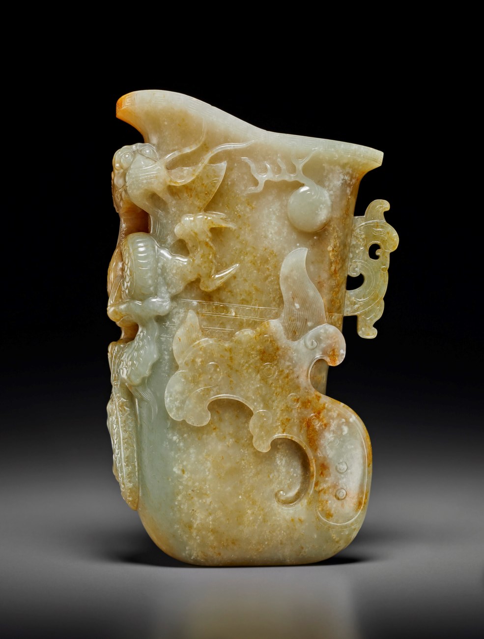 A PALE GREY AND RUSSET JADE RHYTON, GONG, QING DYNASTY, 17TH-18TH ...