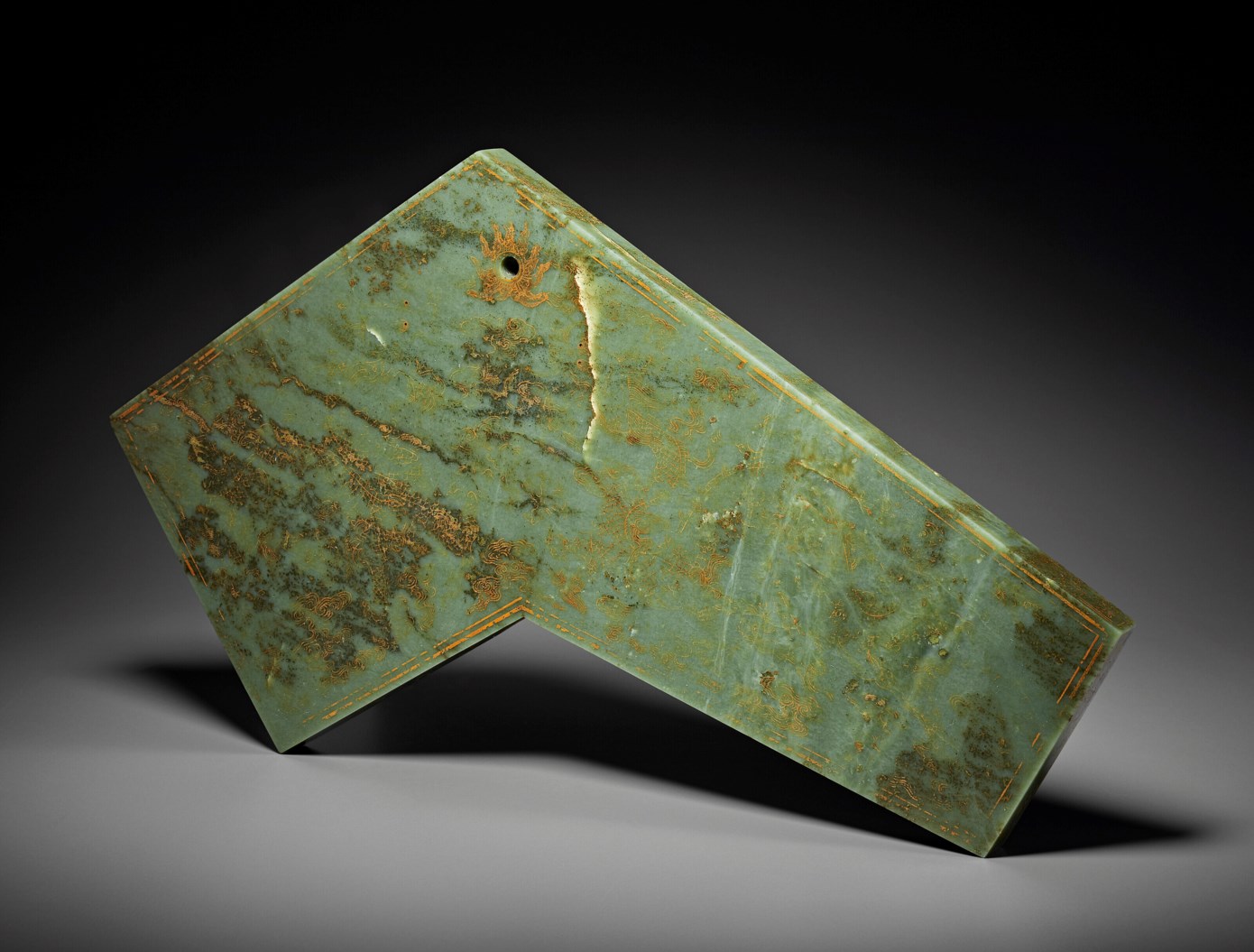 A LARGE GILT-DECORATED SPINACH-GREEN JADE CHIME, BIANQING, DATED BY ...