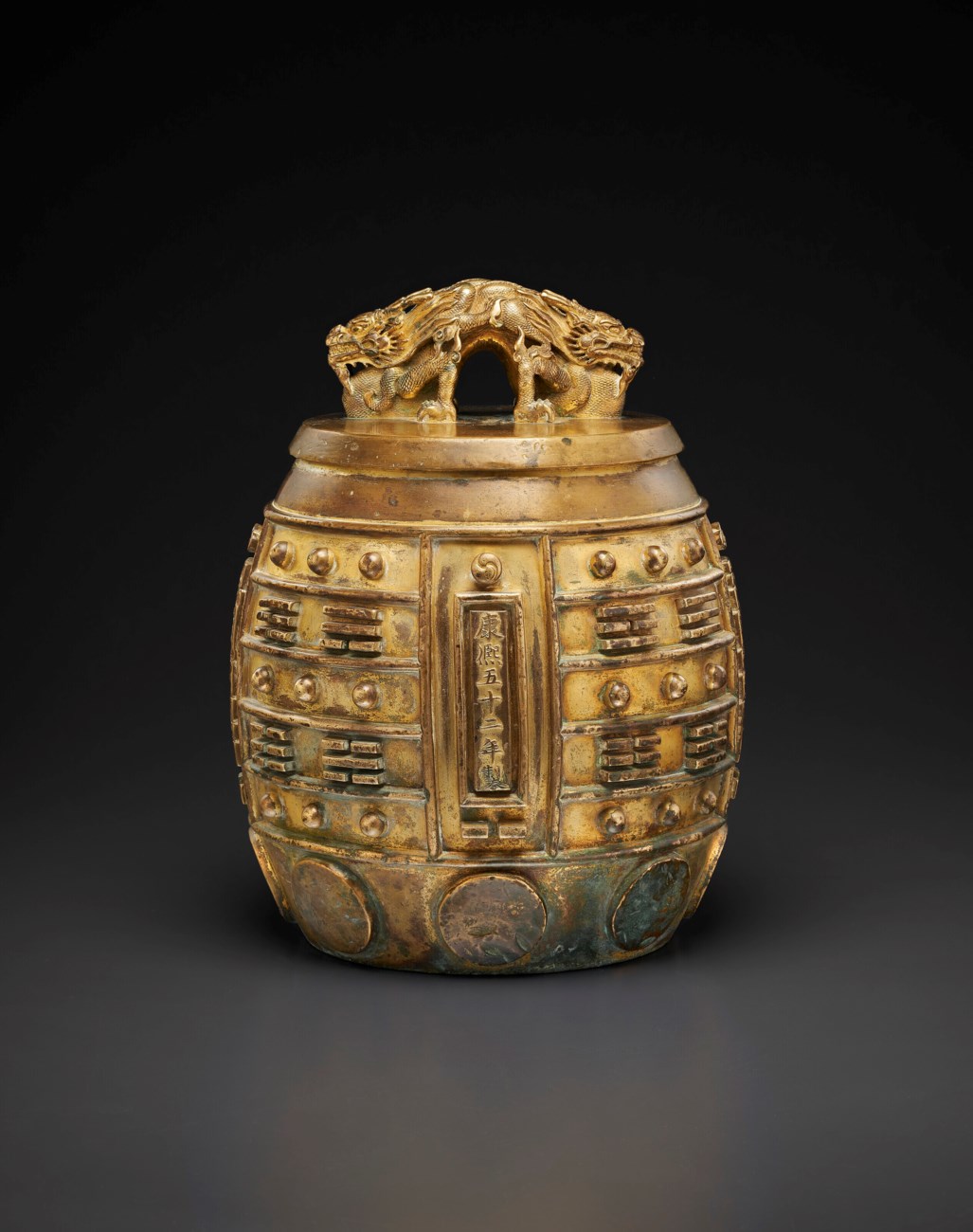 AN IMPERIAL GILT-BRONZE RITUAL BELL, BIANZHONG, KANGXI CAST MARK ...