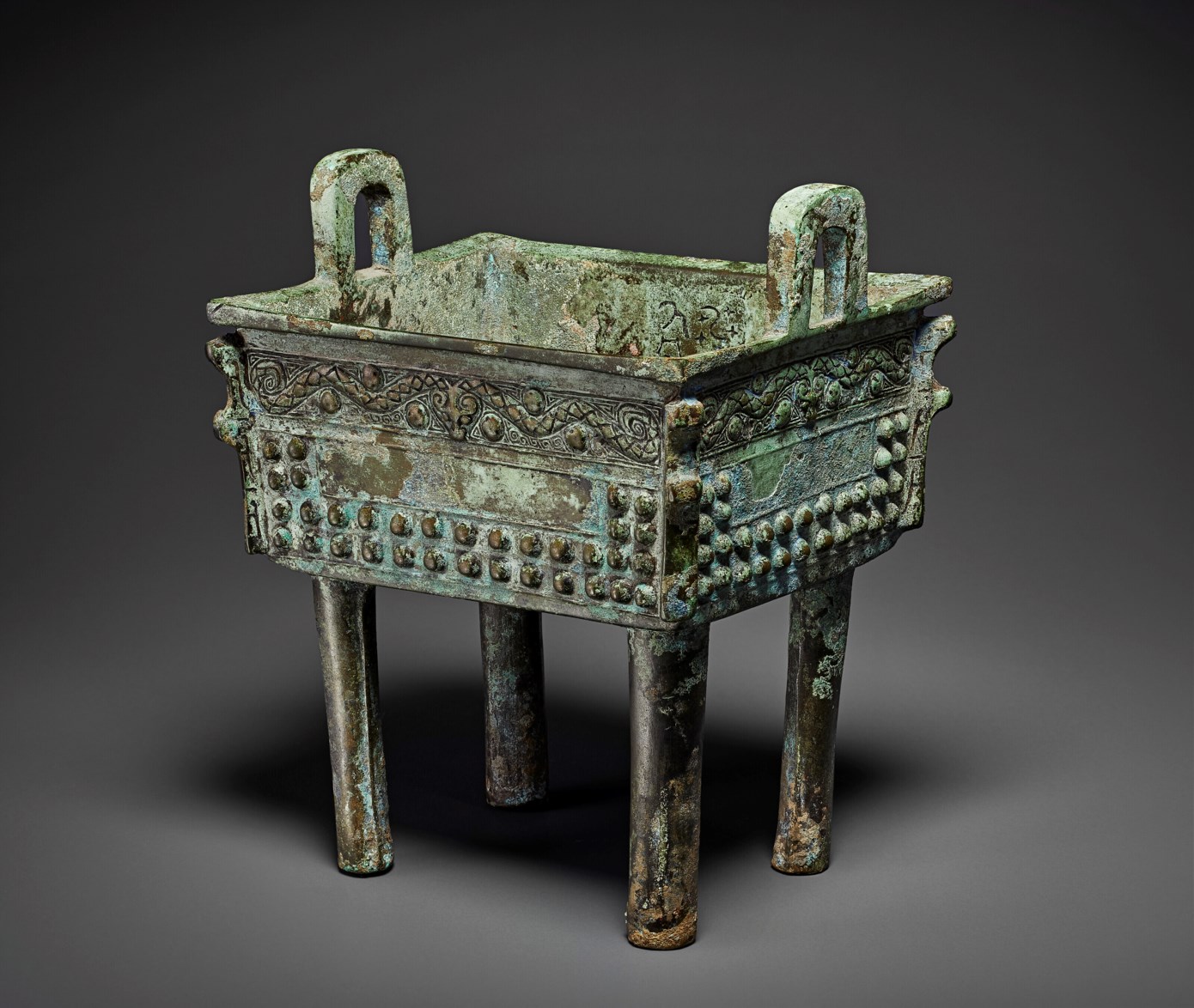 A BRONZE RITUAL RECTANGULAR FOOD VESSEL, FANGDING, LATE SHANG-EARLY ...