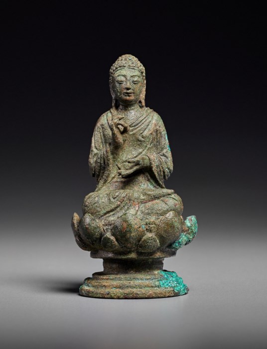 A SMALL BRONZE FIGURE OF SEATED BUDDHA