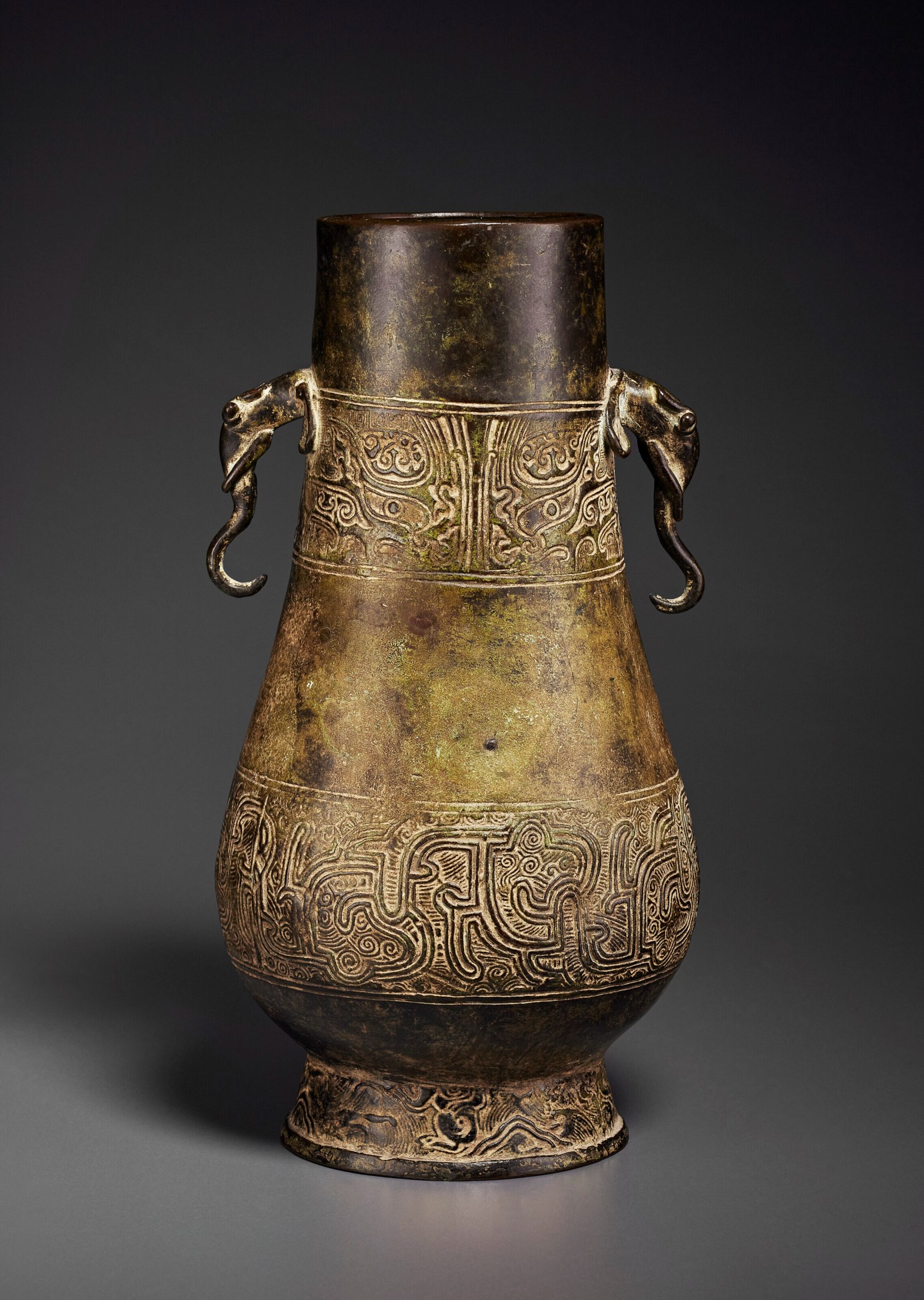 A BRONZE ARCHAISTIC HU-SHAPED VASE , YUAN DYNASTY (1279-1368) | Christie's