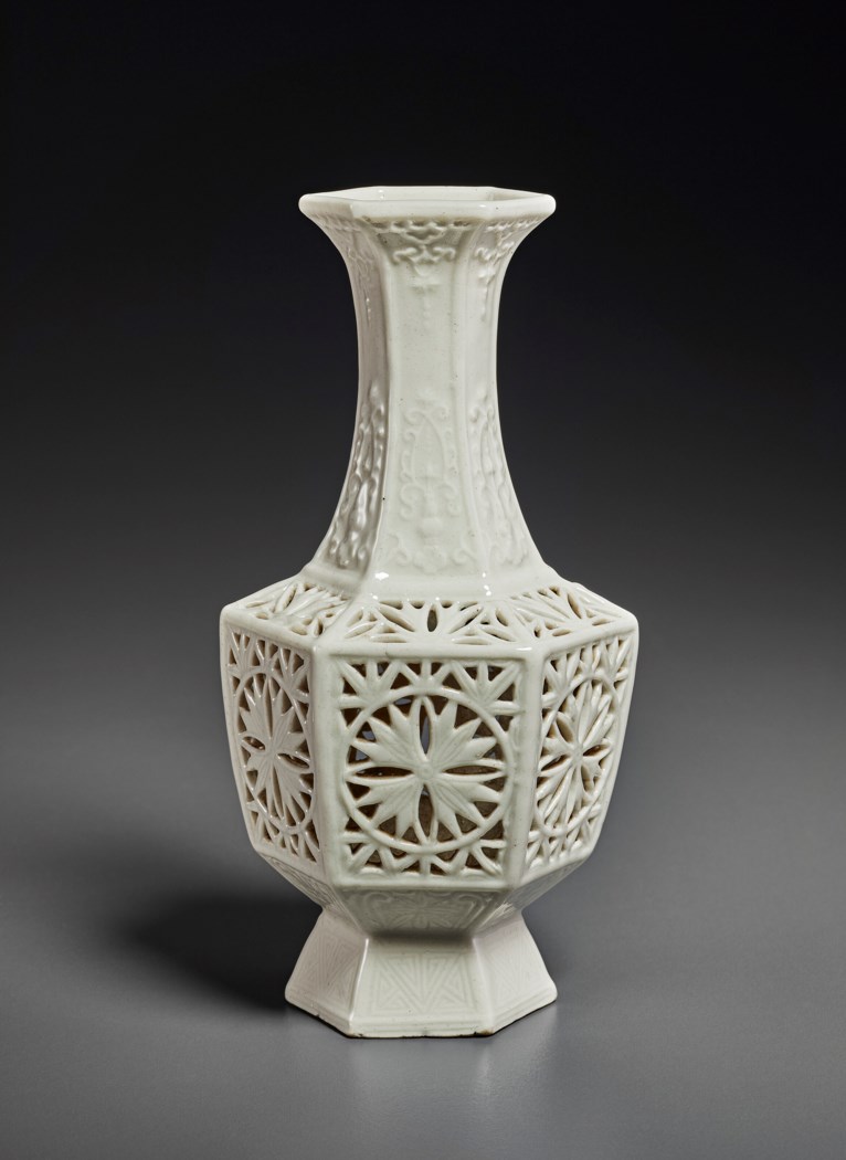 A WHITE-GLAZED RETICULATED HEXAGONAL BOTTLE VASE, 18TH CENTURY | Christie's