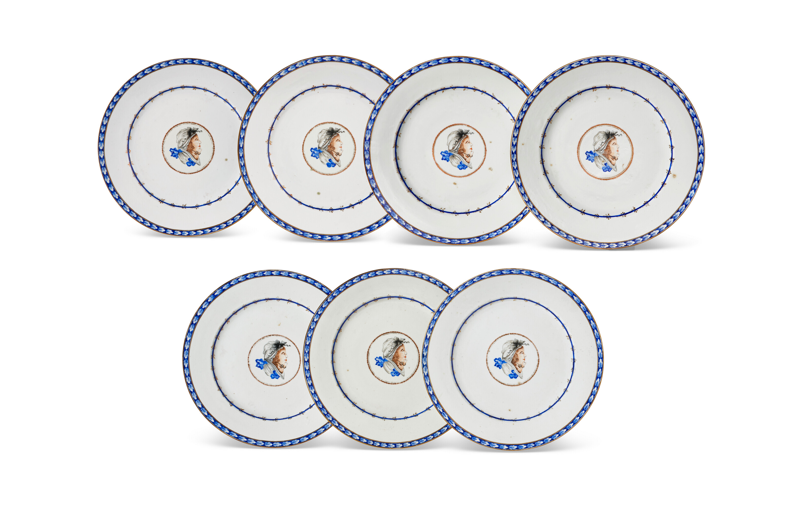 A SET OF SEVEN CHINESE EXPORT PORCELAIN 'REVERSIBLE' PORTRAIT PLATES ...