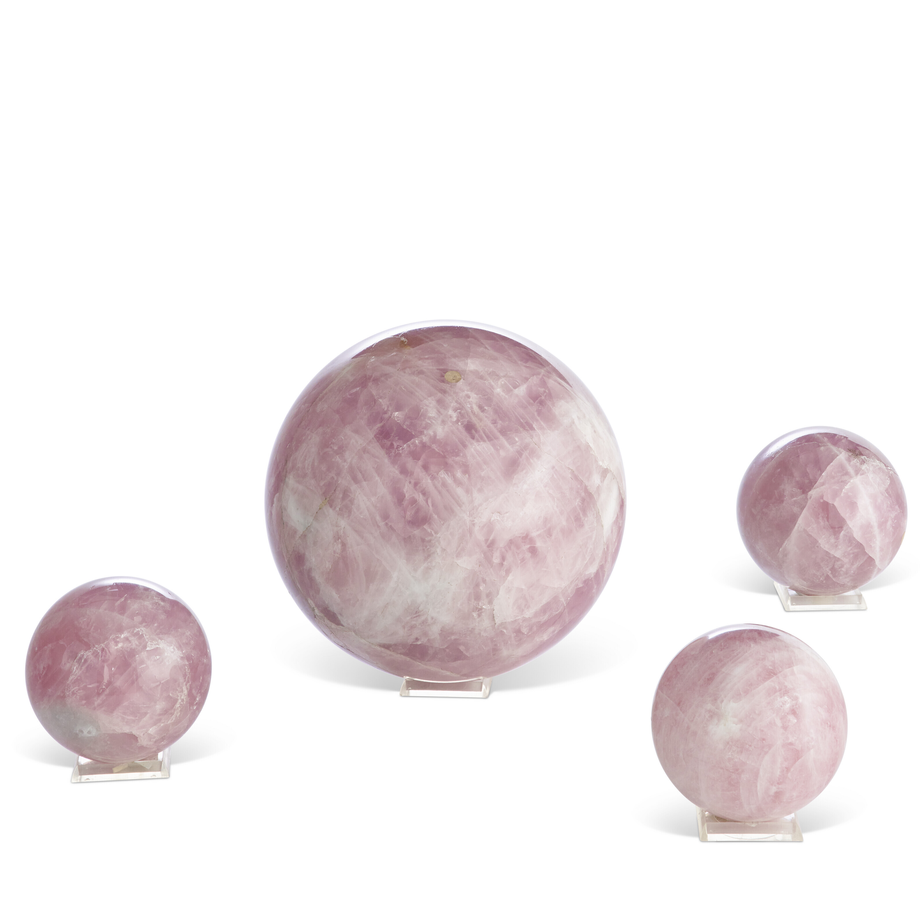 A GROUP OF ROSE QUARTZ SPHERES, MODERN | Christie’s