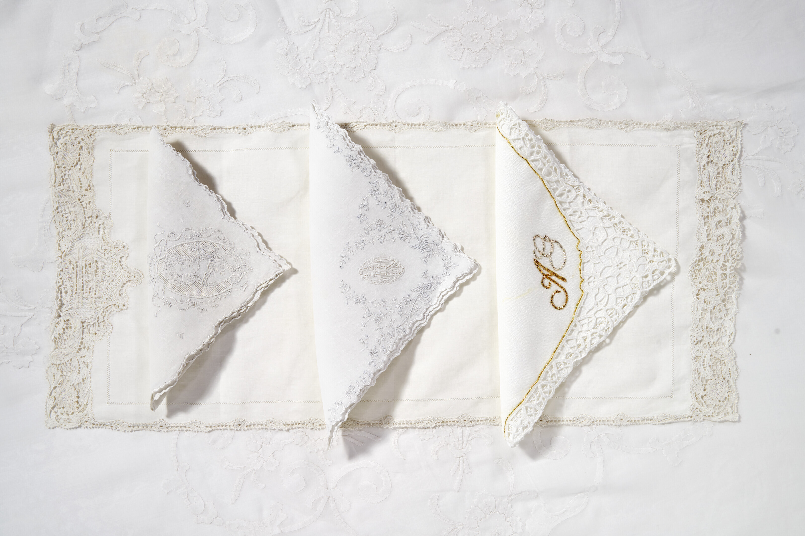 A SUITE OF EMBROIDERED TABLE LINENS, 20TH CENTURY | Christie’s