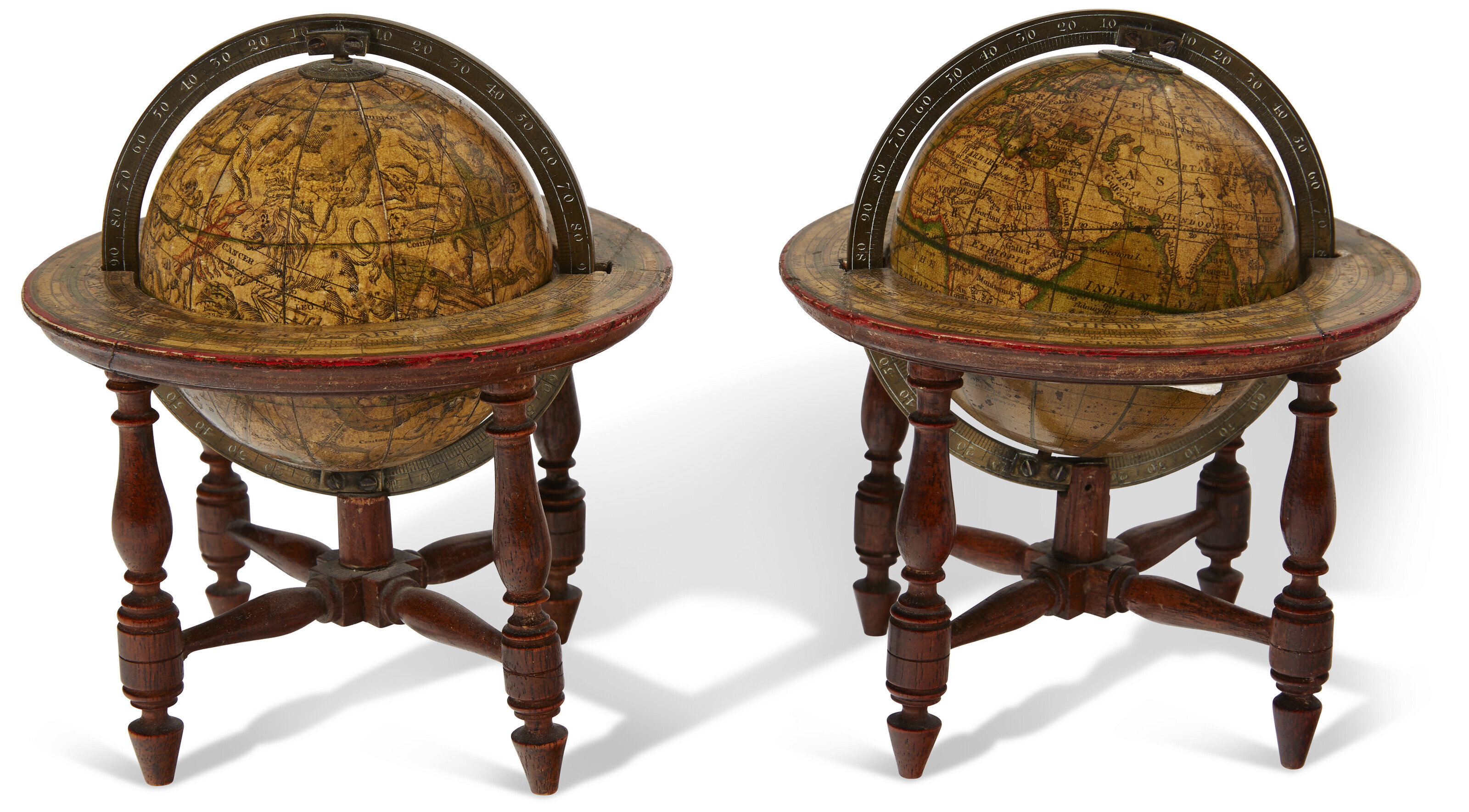 A PAIR OF GEORGE IV TERRESTRIAL AND CELESTIAL MINIATURE TABLE GLOBES ...