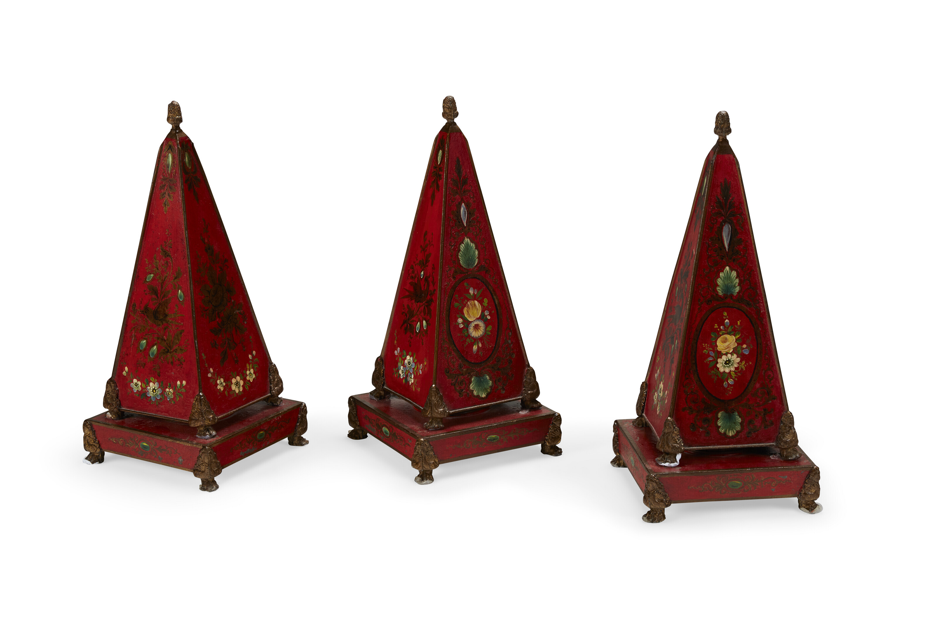 A SET OF THREE FRENCH TOLE-PEINTE AND PARCEL-GILT OBELISK FORM ...