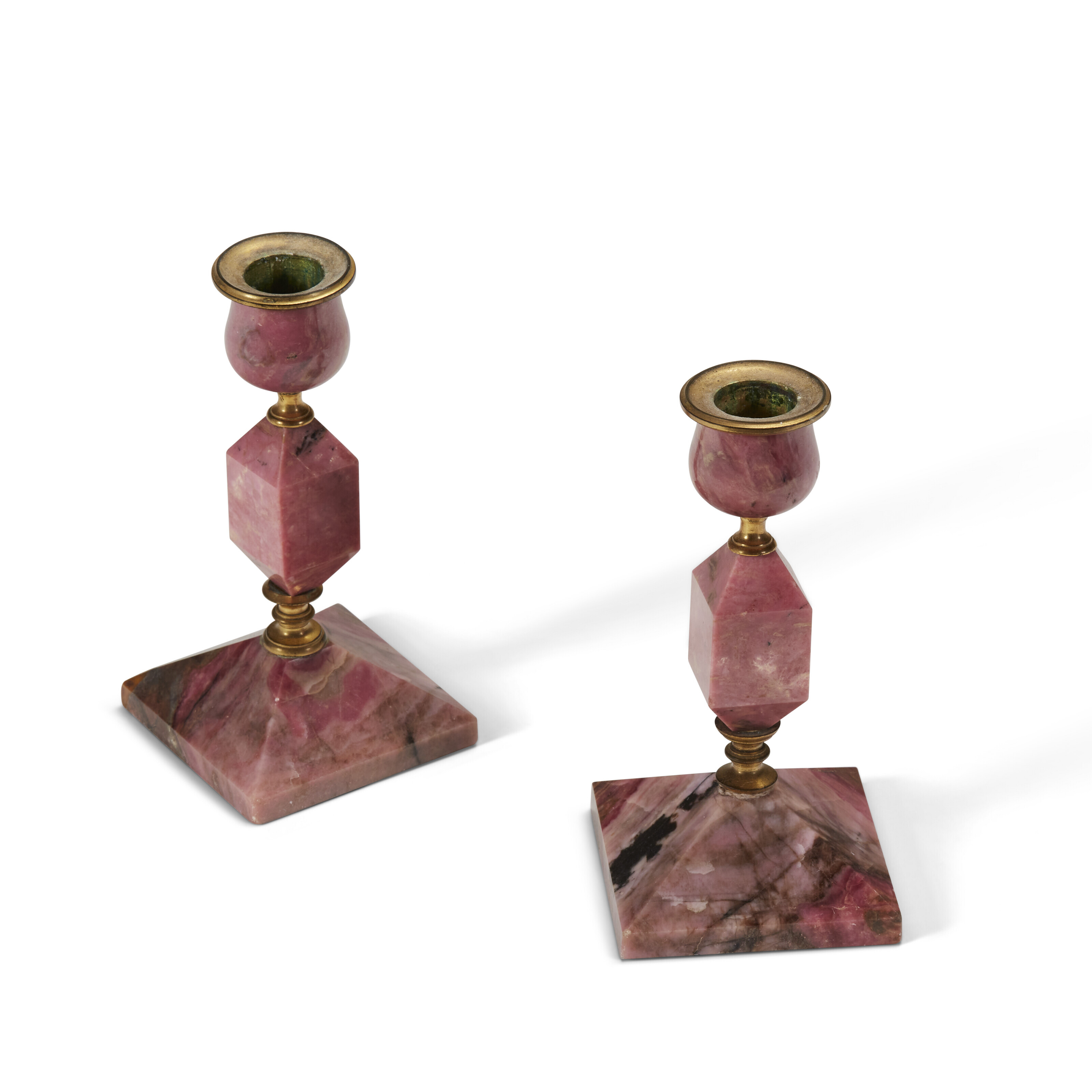 A PAIR OF RHODONITE AND GILT-METAL CANDLESTICKS, PROBABLY RUSSIAN, LATE ...