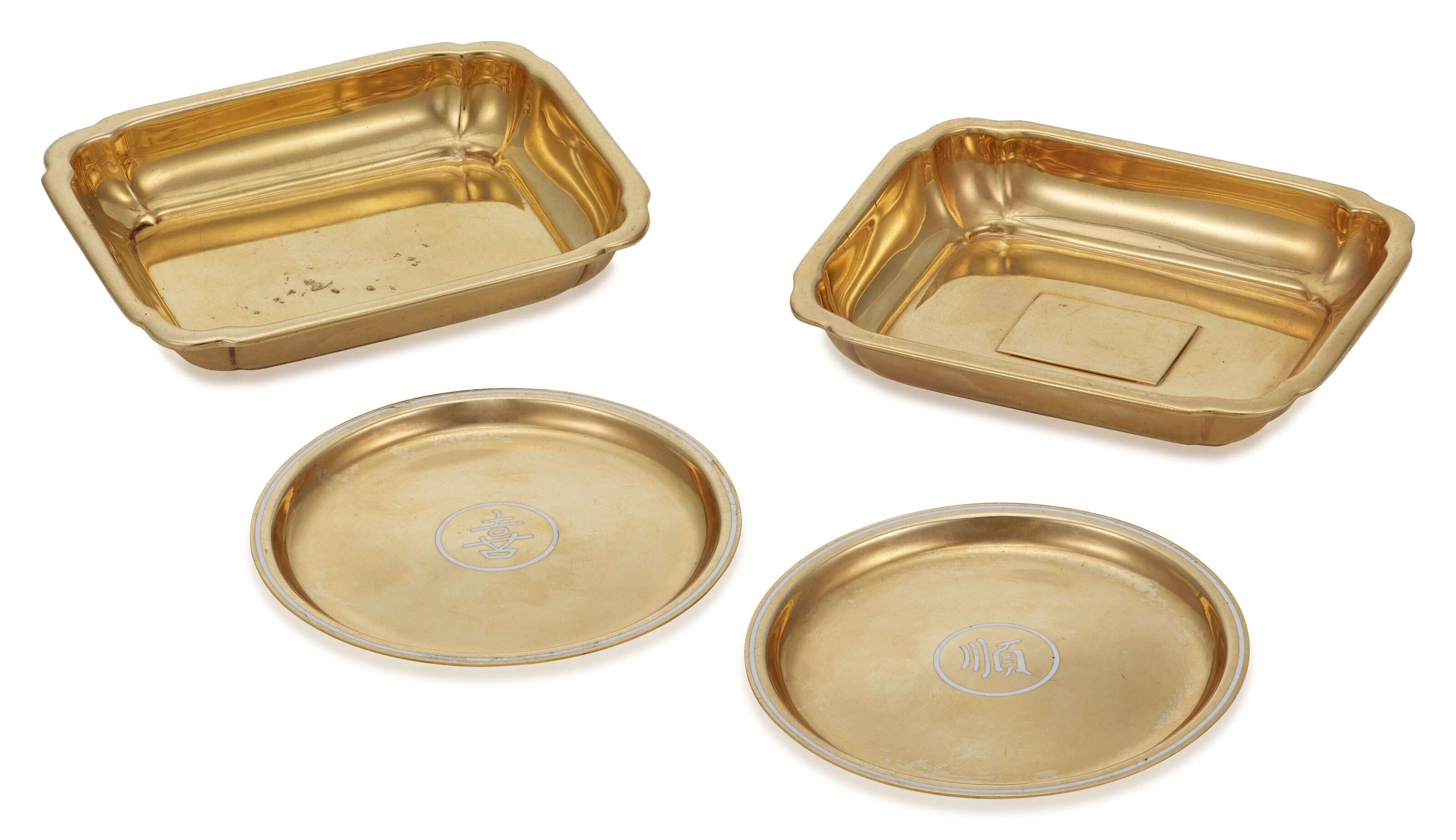 NO RESERVE | FOUR CARTIER GOLD AND ENAMEL RECEIVING TRAYS, | Christie’s