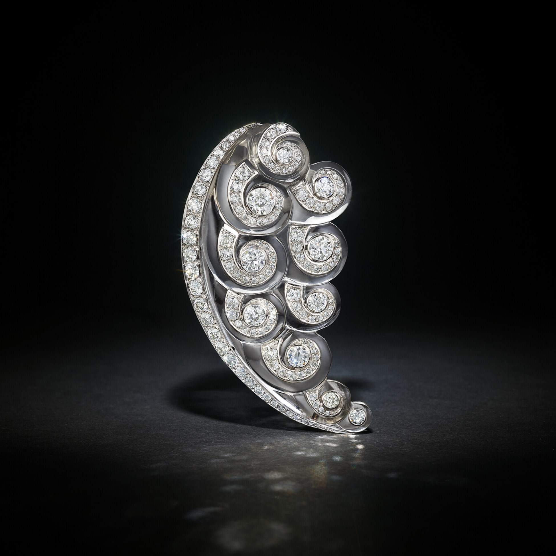 BELPERRON ROCK CRYSTAL AND DIAMOND 'WING' BROOCH | Christie's