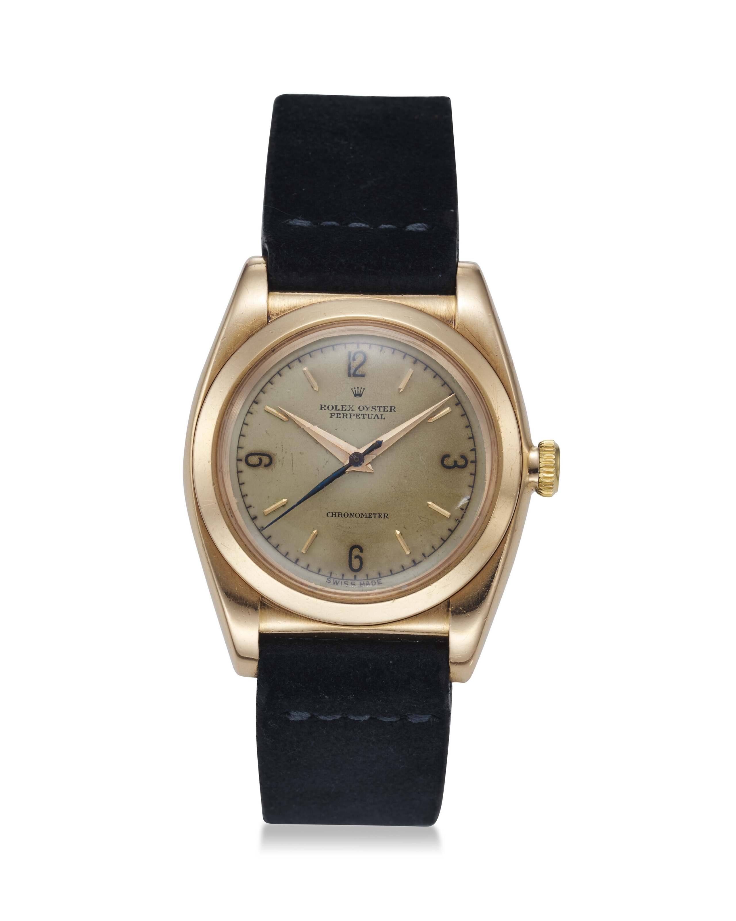 ROLEX. REF. 3131, “BUBBLEBACK”, A 14K PINK GOLD WATER RESISTANT ...