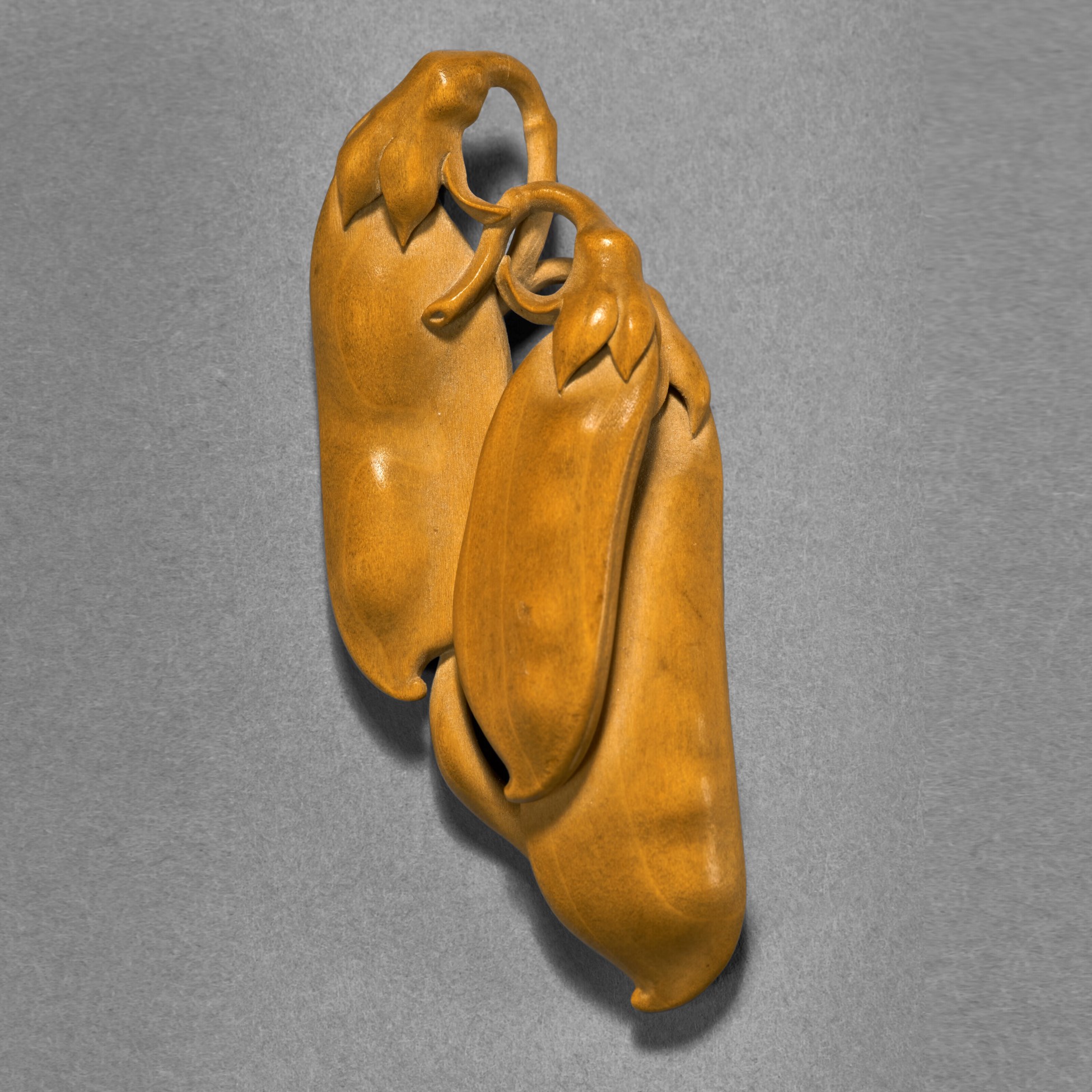 A CARVED WOOD SCULPTURE (NETSUKE) OF BEAN PODS, TAISHO-SHOWA PERIOD ...