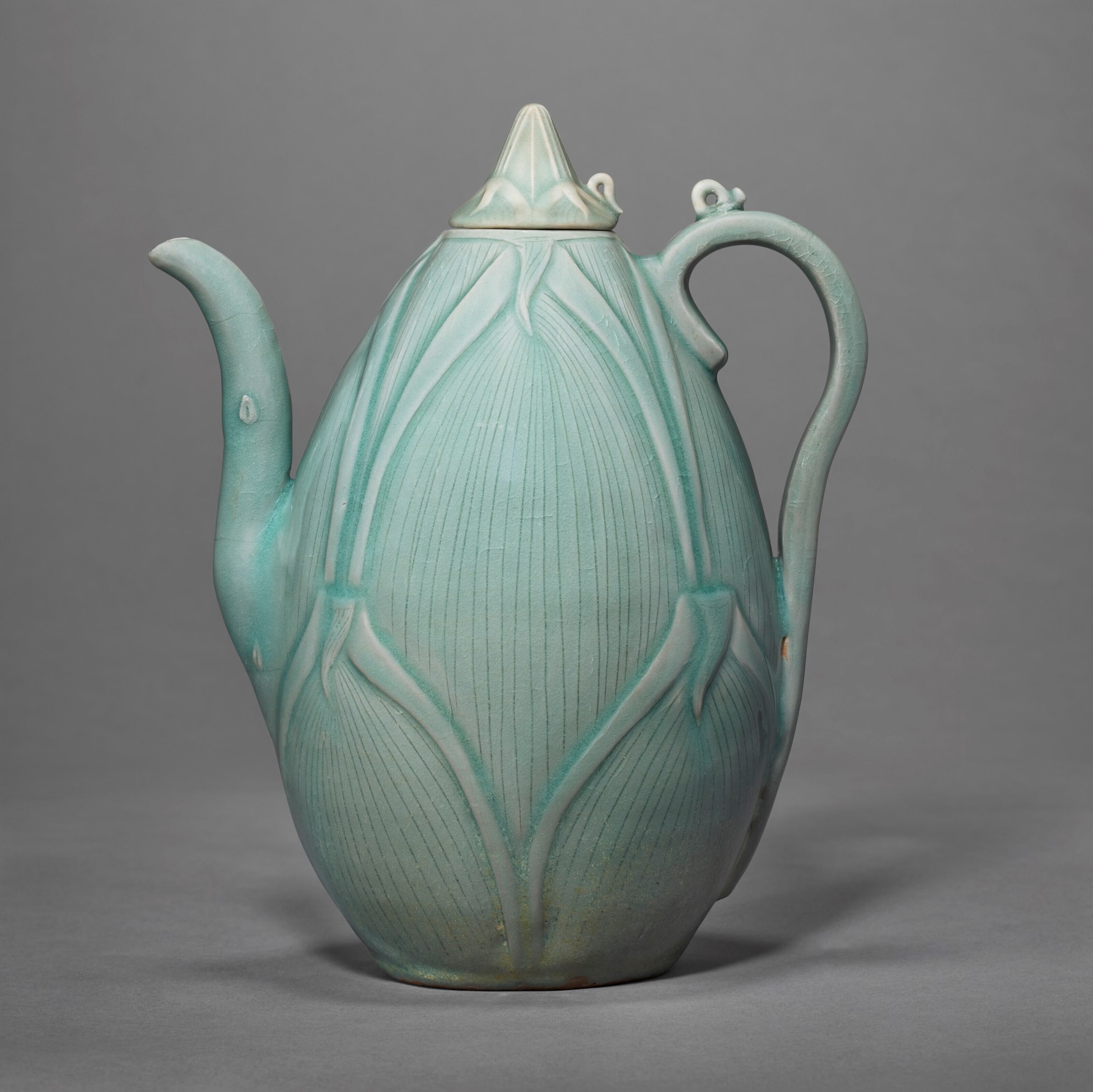 A CELADON GLAZED STONEWARE EWER, GORYEO DYNASTY (12TH CENTURY) | Christie's