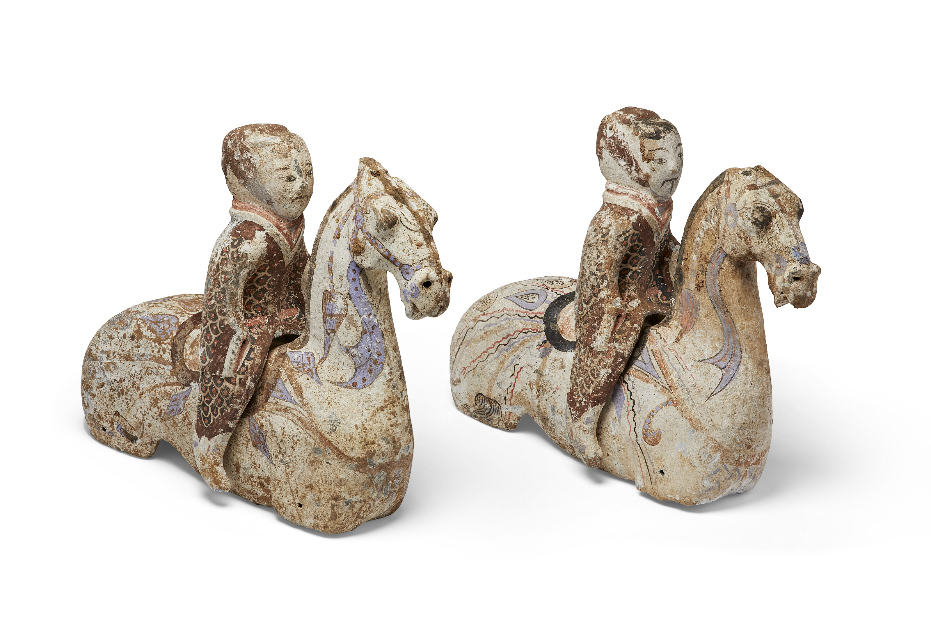 A PAIR OF PAINTED POTTERY FIGURES OF EQUESTRIANS, HAN DYNASTY (206 BC ...