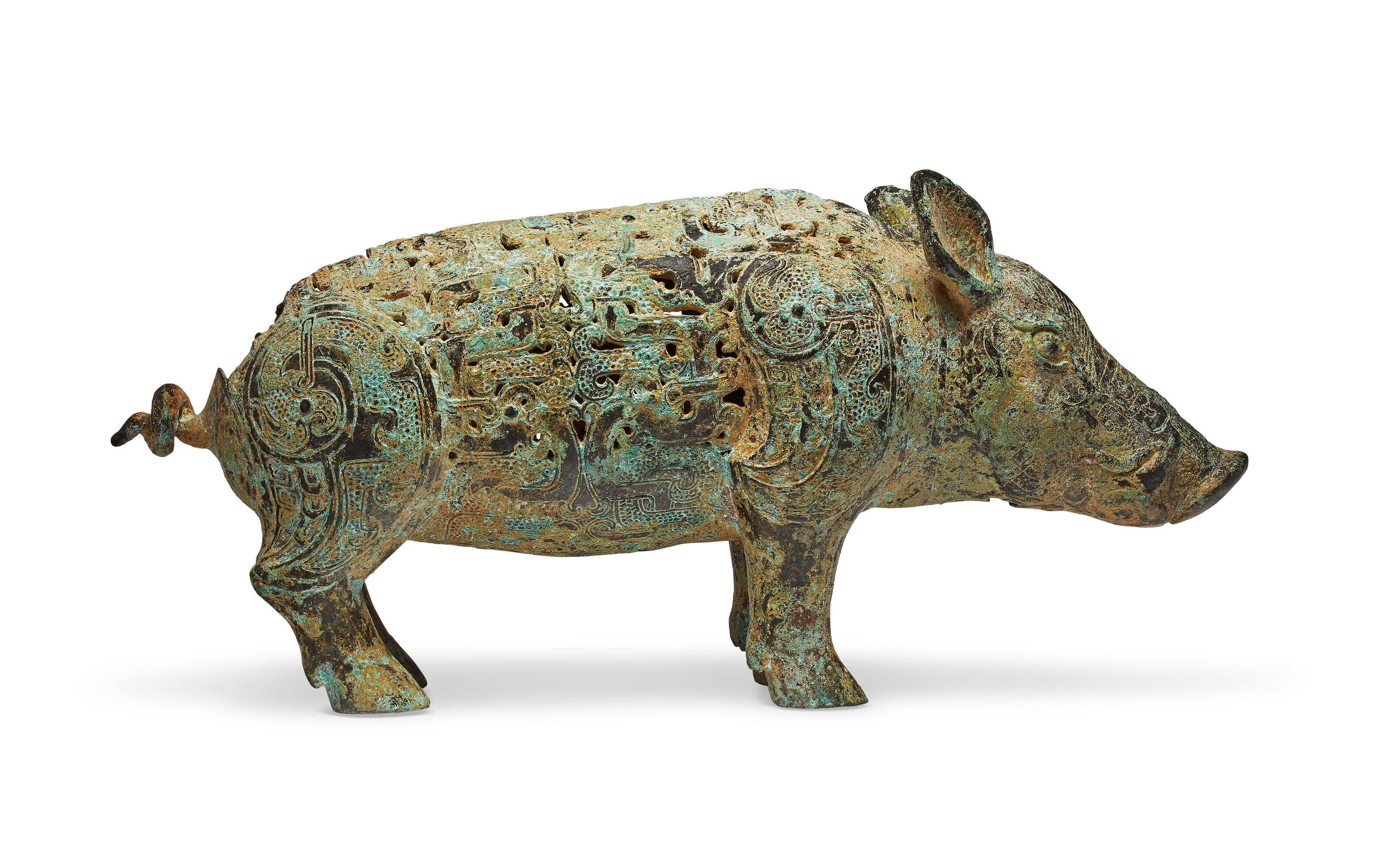 A BRONZE OPENWORK FIGURE OF A BOAR, | Christie’s