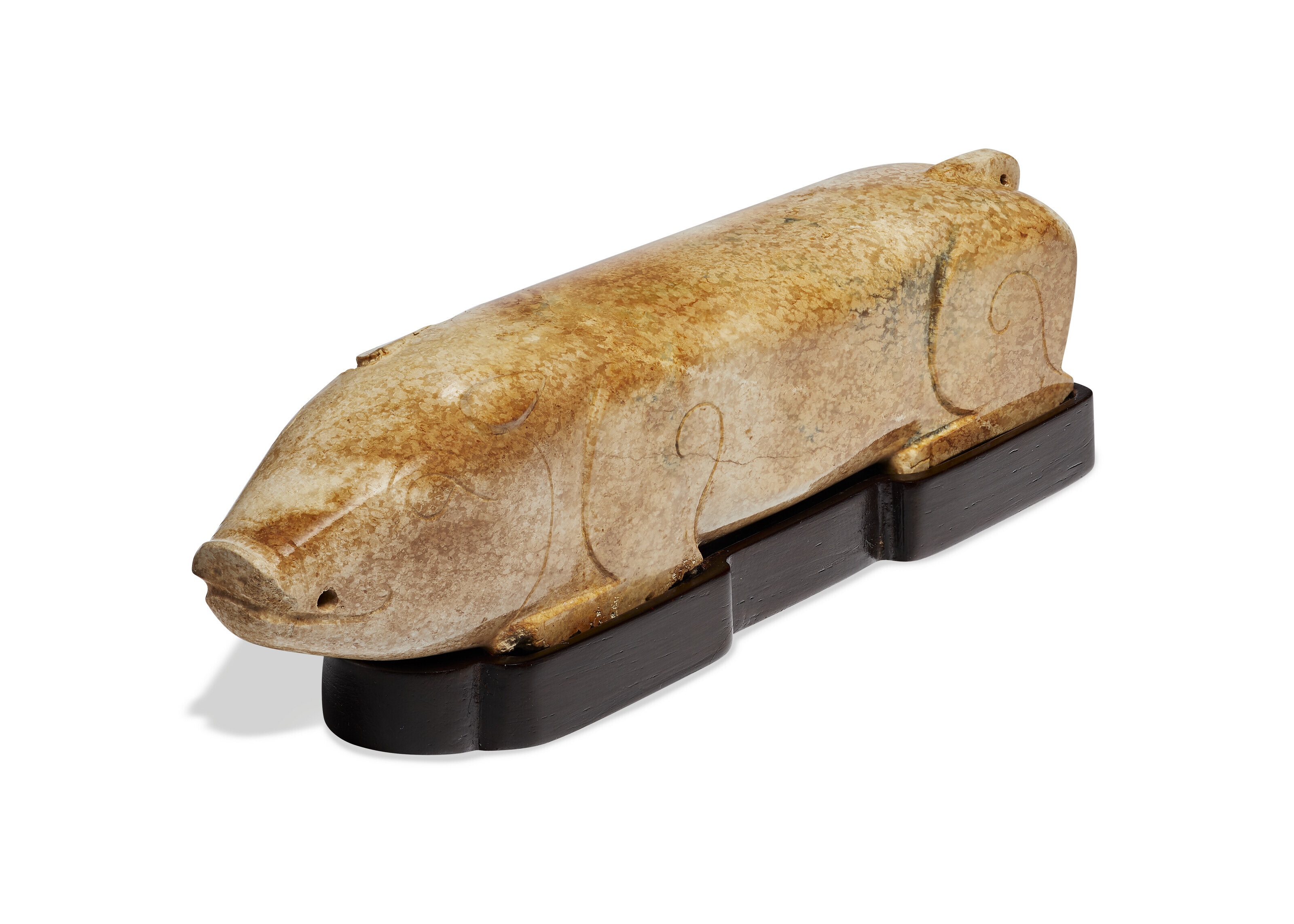 A GREENISH-BROWN JADE CARVING OF A PIG, HAN DYNASTY (206 BC-AD 220 ...