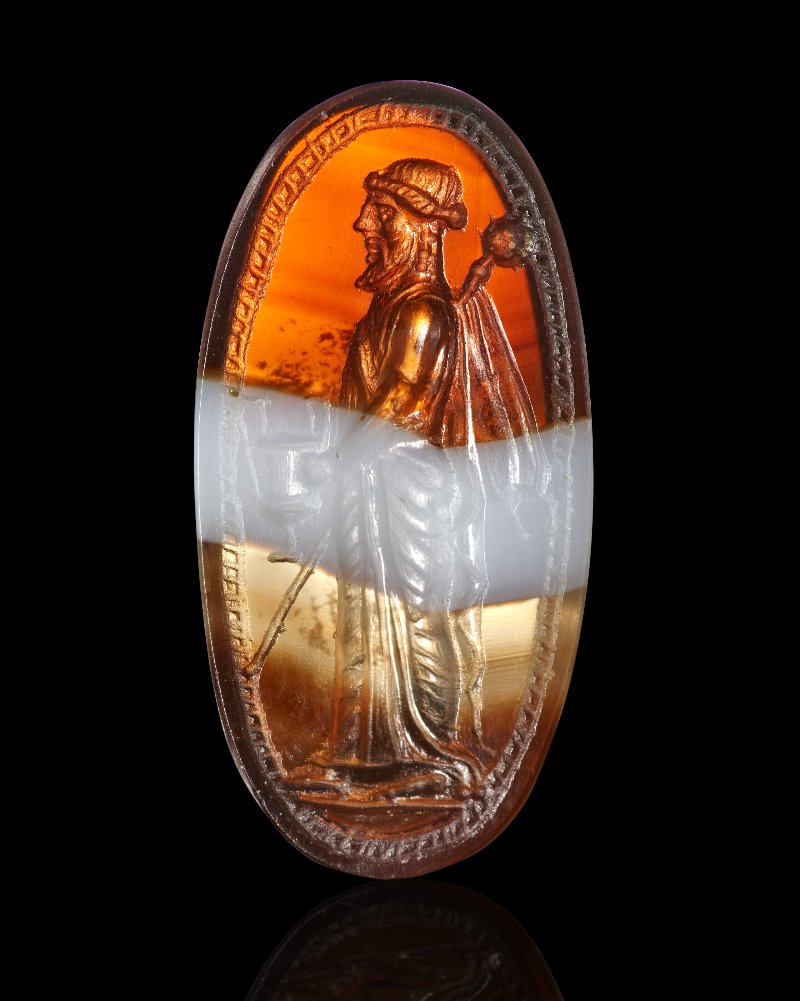 AN ITALIC BANDED AGATE RINGSTONE WITH FUFLUNS, CIRCA 2ND CENTURY B.C ...