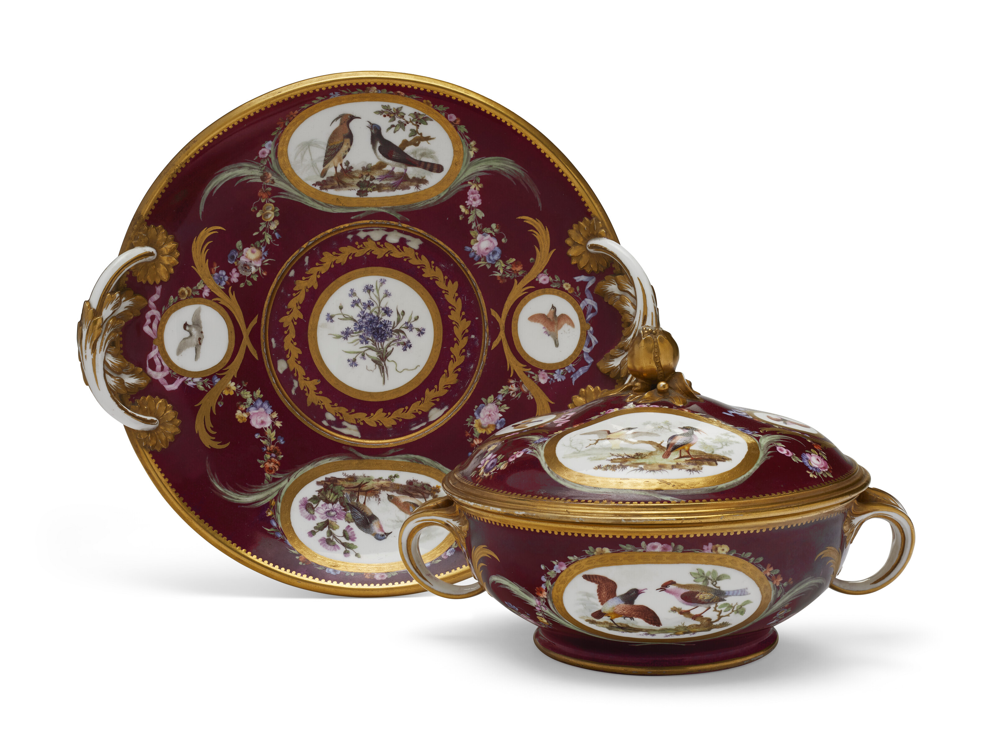 A SEVRES PORCELAIN CLARET-GROUND ECUELLE, COVER AND STAND (ECUELLE ET ...