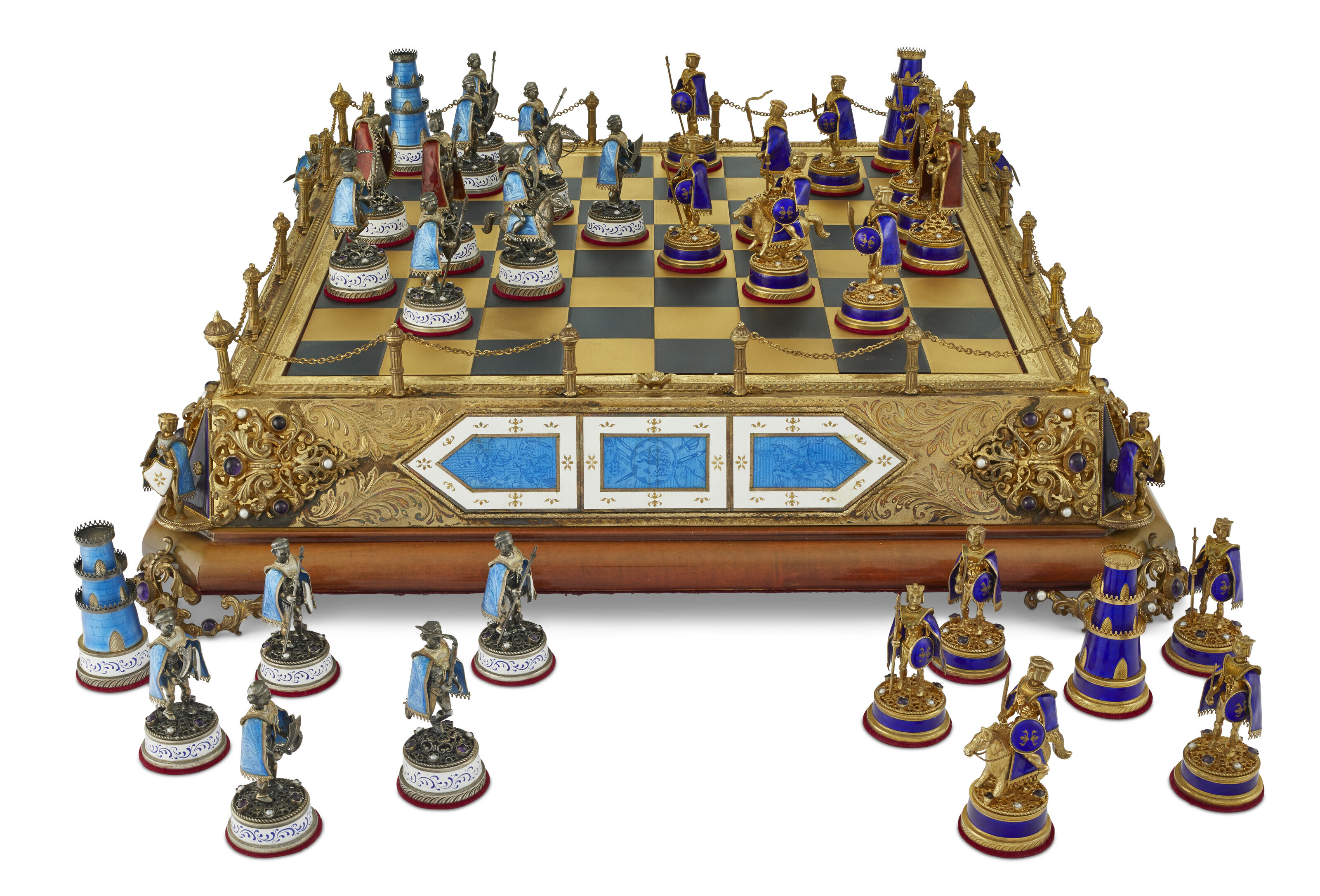 A CONTINENTAL SILVER AND ENAMEL CHESS SET AND BOARD, PROBABLY AUSTRIAN ...