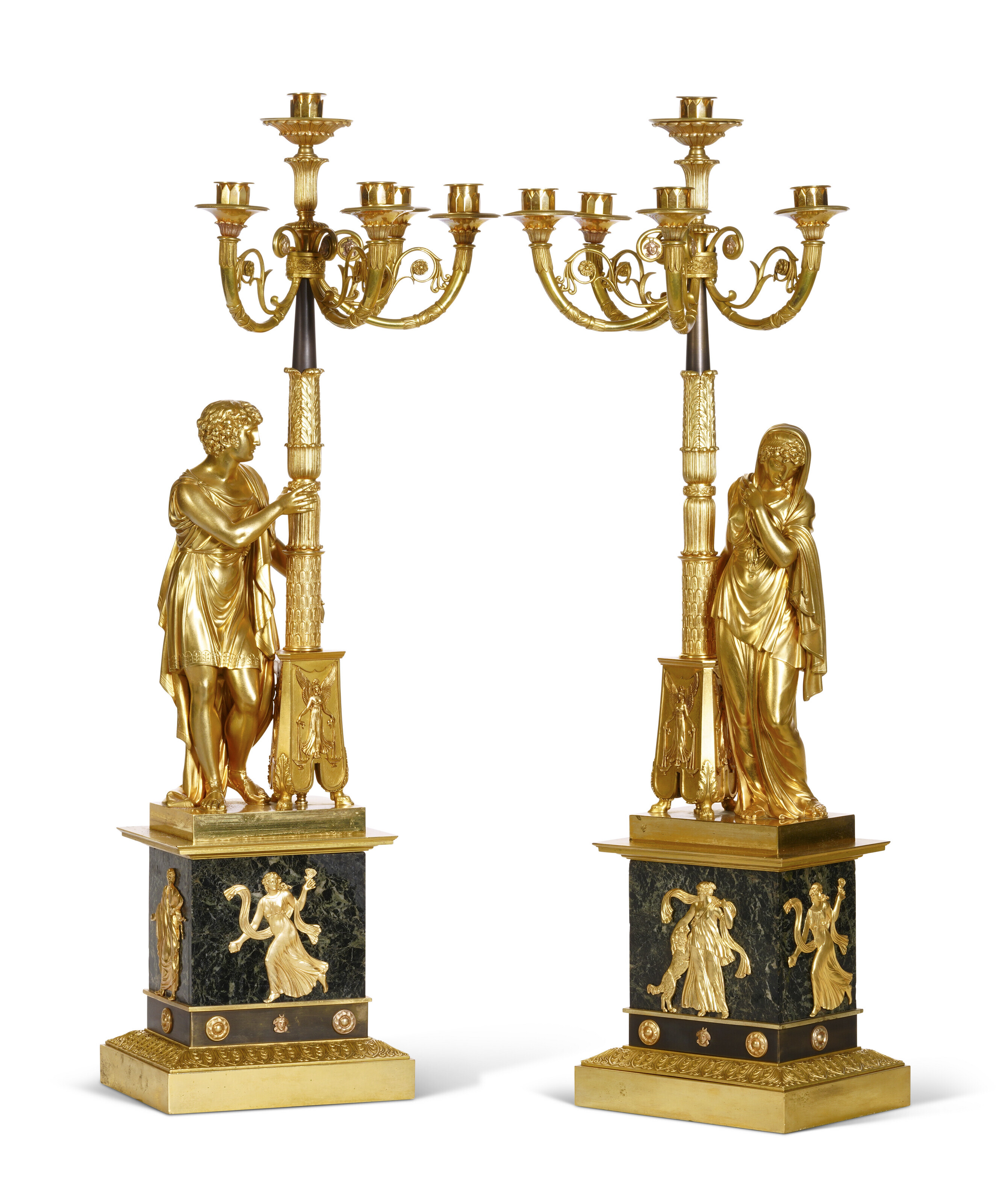 A PAIR OF RESTAURATION ORMOLU AND PATINATED BRONZE FIVE-LIGHT ...