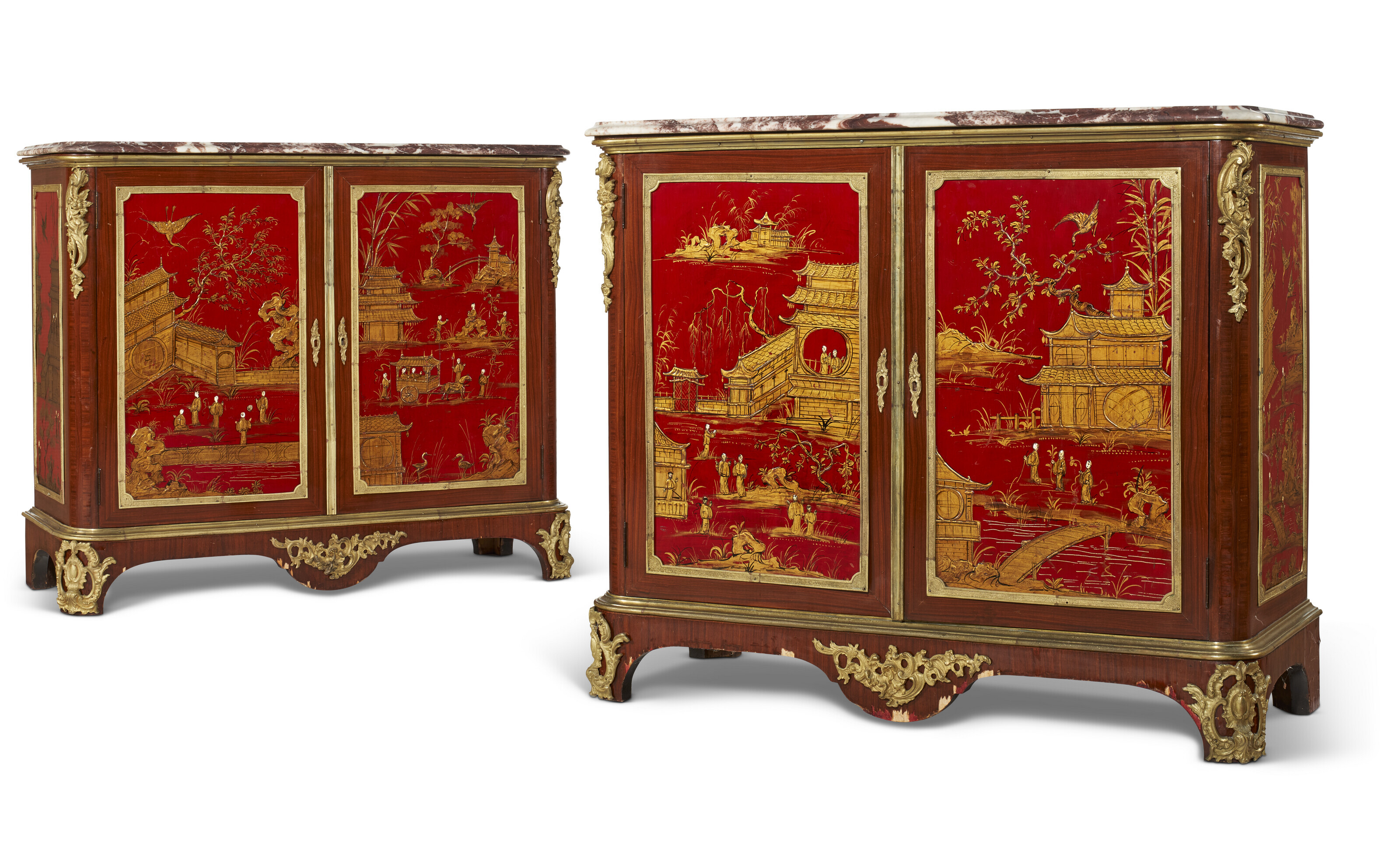 A PAIR OF FRENCH ORMOLU-MOUNTED MAHOGANY AND RED-LACQUERED SIDE ...