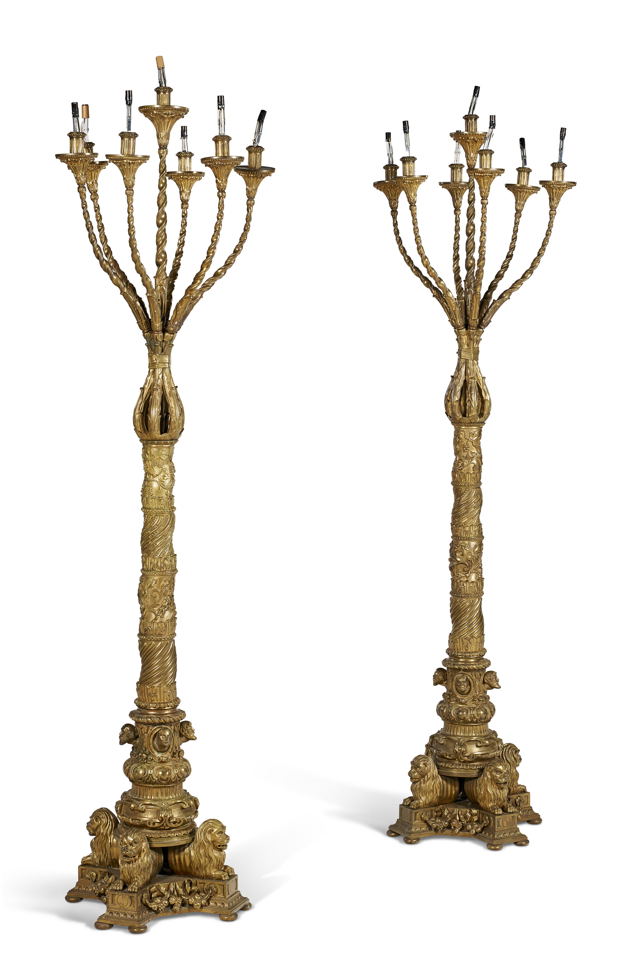 A PAIR OF RENAISSANCE STYLE GILT-METAL SEVEN-LIGHT TORCHERES, EARLY ...