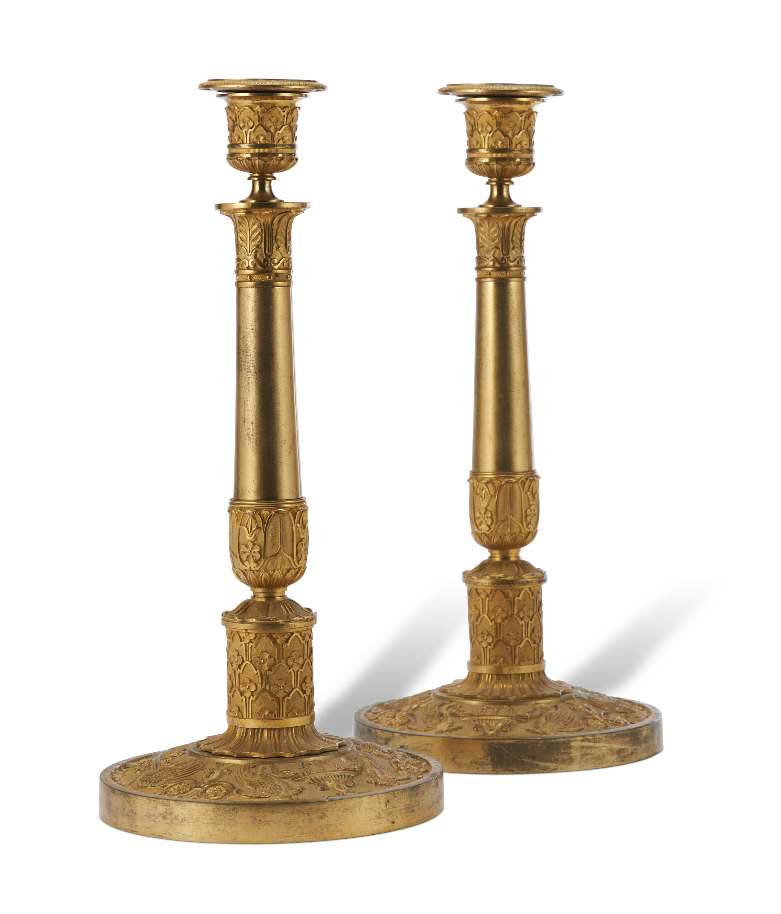 A PAIR OF CHARLES X ORMOLU CANDLESTICKS, CIRCA 1825 | Christie’s