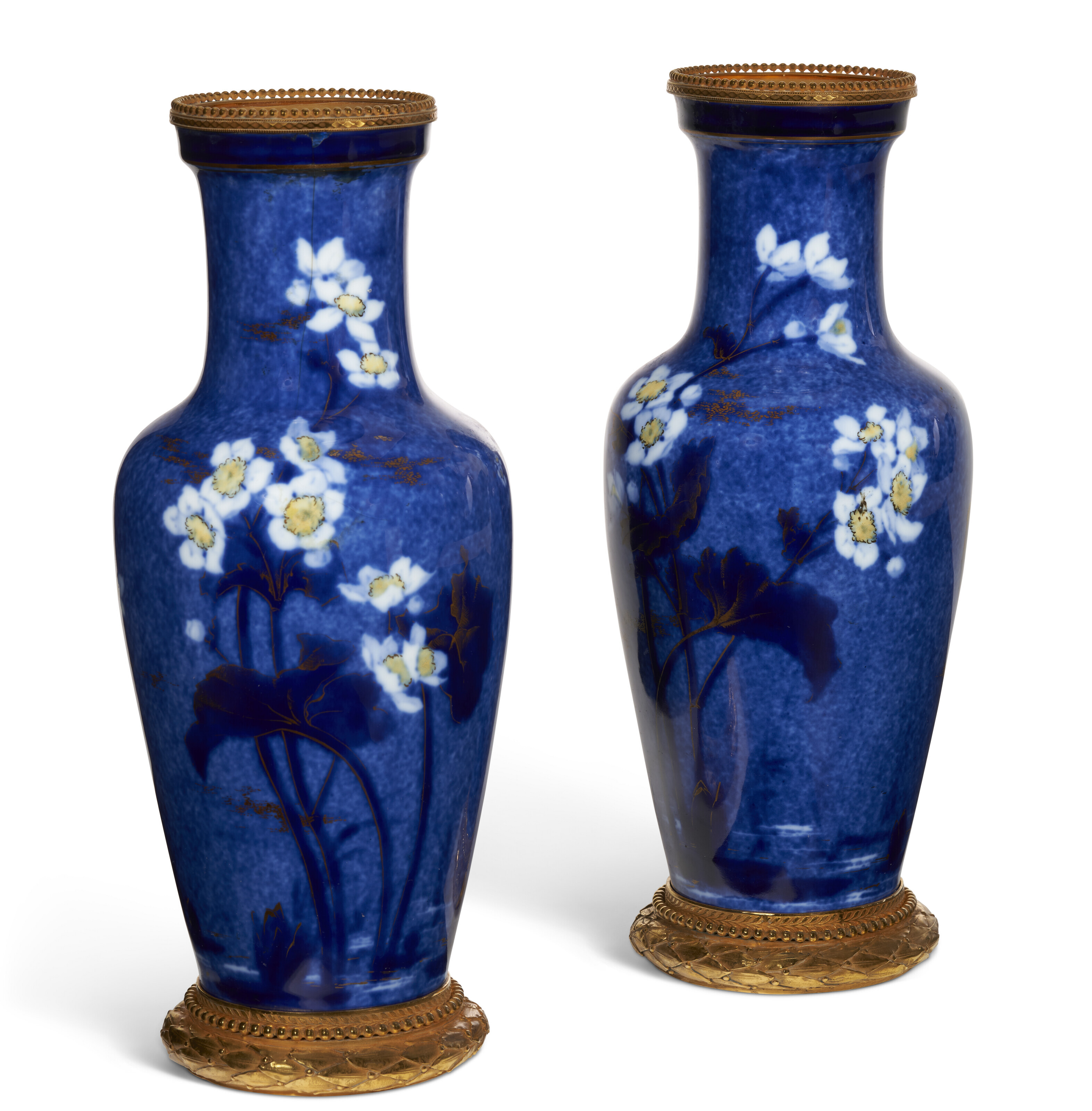 A PAIR OF GILT-METAL MOUNTED SEVRES PORCELAIN POWDER-BLUE GROUND VASES ...