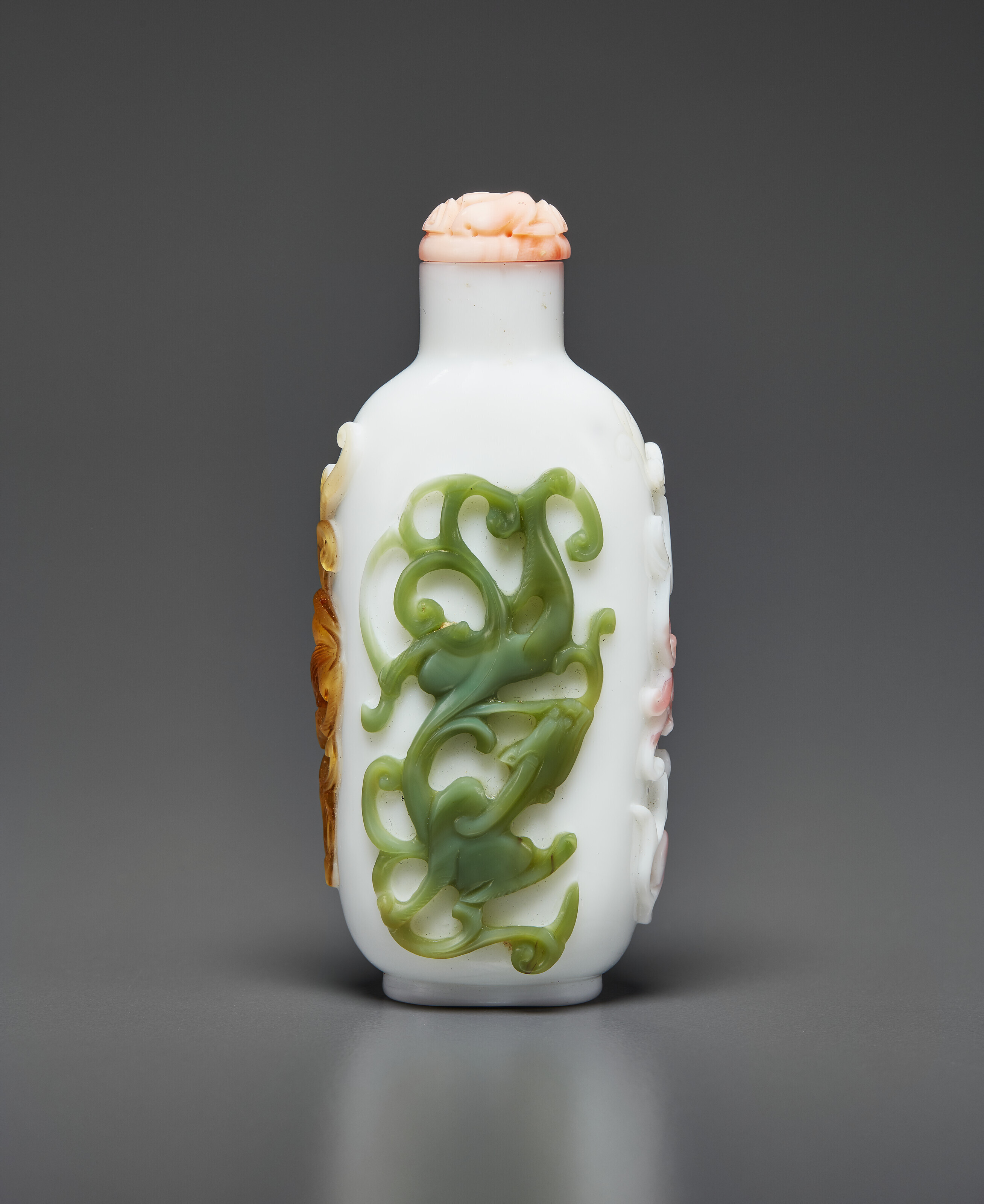 A CARVED TRANSPARENT PALE BLUE GLASS SNUFF BOTTLE, 1750-1800 | Christie's