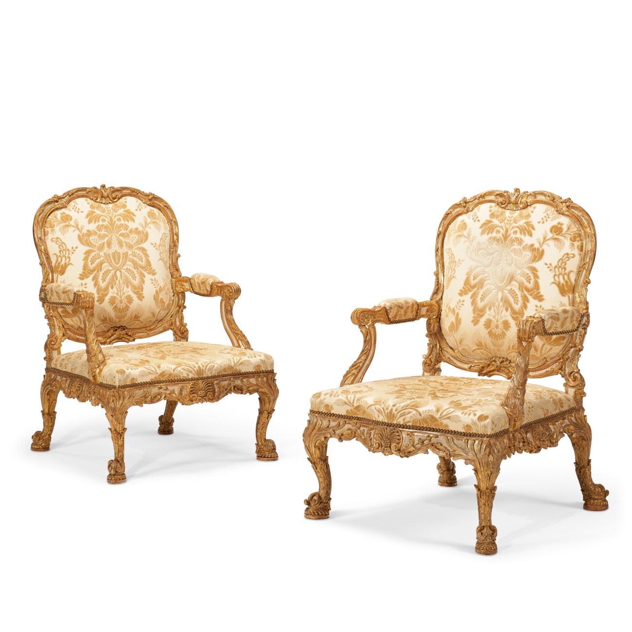 A PAIR OF GEORGE II WHITE-PAINTED AND PARCEL-GILT ARMCHAIRS, DESIGNED ...