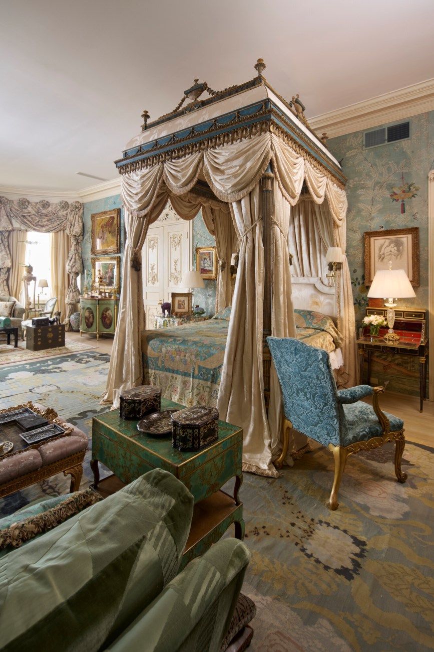 A GEORGE III BLUE-PAINTED AND PARCEL-GILT TESTER BED