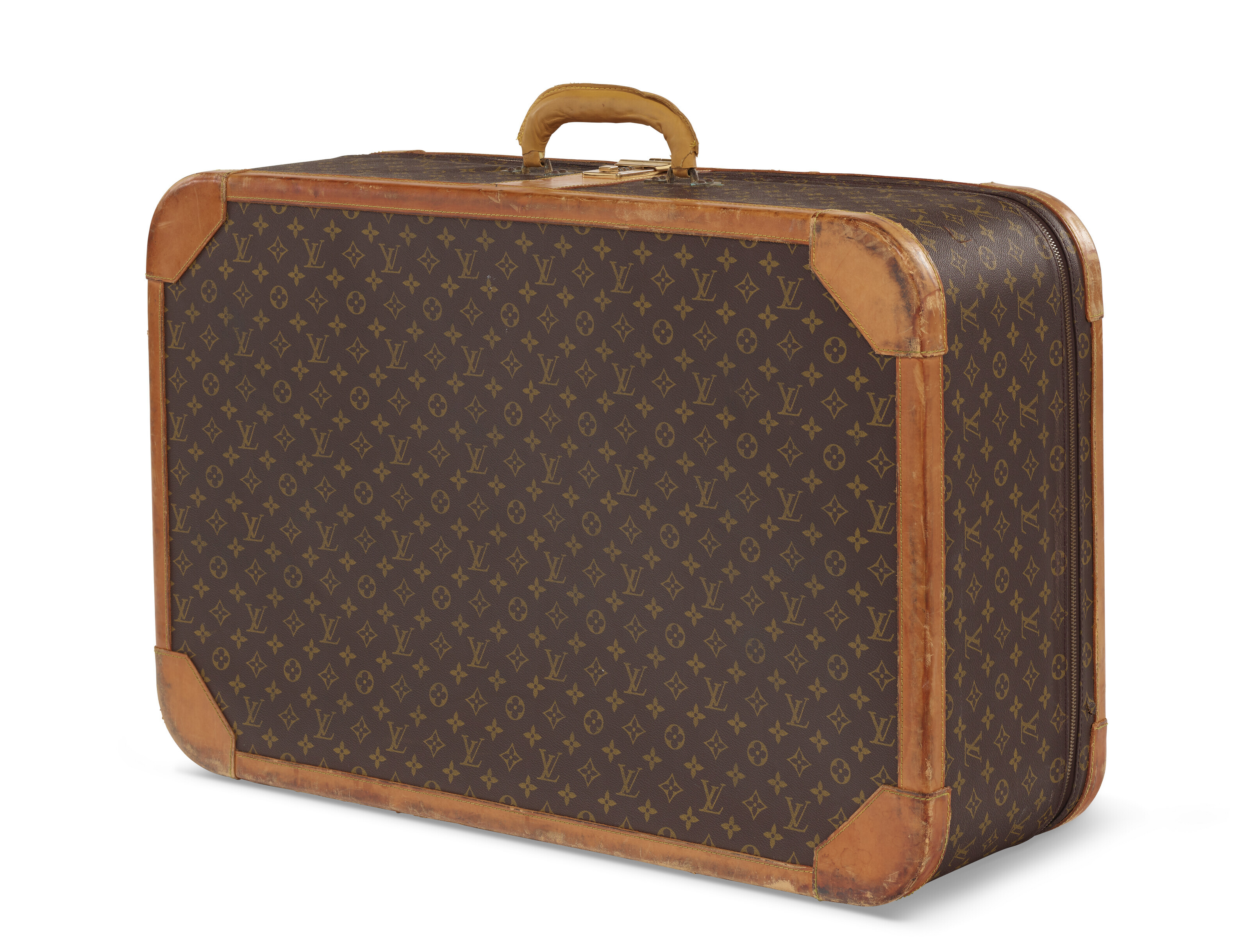 A CLASSIC MONOGRAM CANVAS SUITCASE, LOUIS VUITTON, CIRCA 1980 | Christie’s