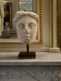 A GREEK MARBLE FEMALE HEAD