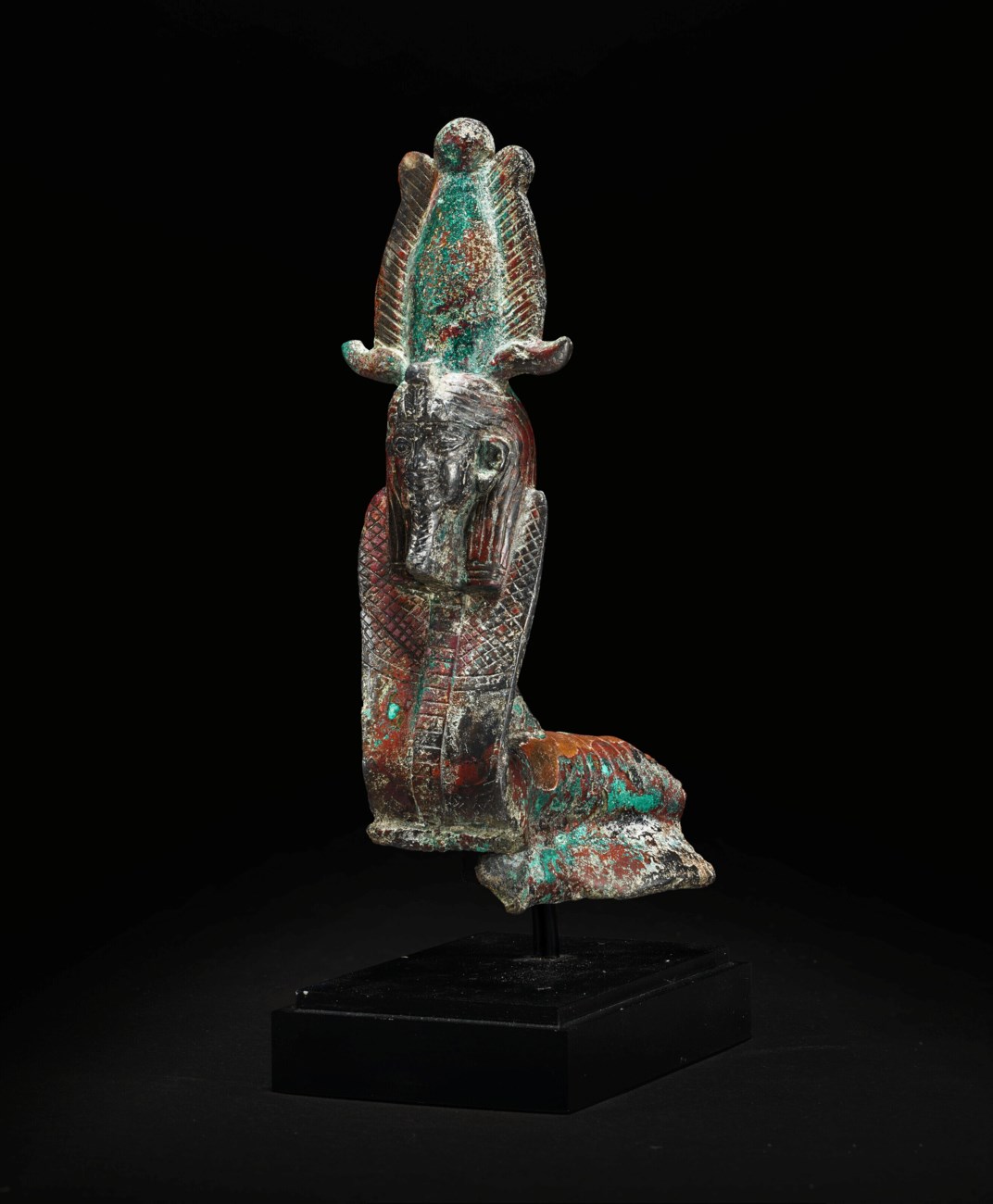 AN EGYPTIAN BRONZE ATUM IN THE FORM OF A HUMAN-HEADED SERPENT, THIRD ...