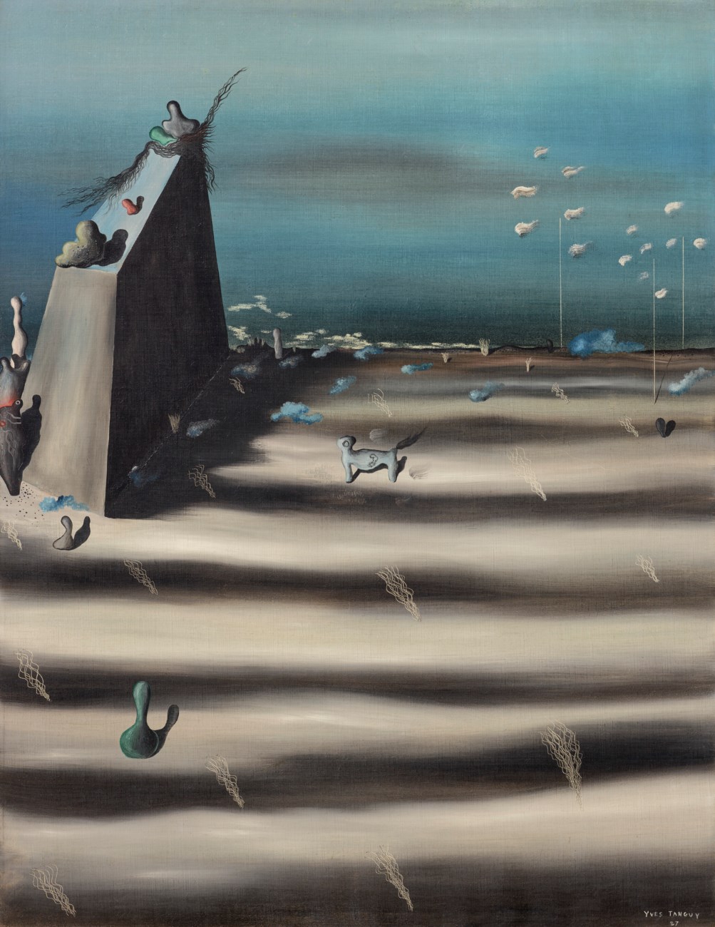 YVES TANGUY (1900-1955), Un grand tableau qui représente un paysage ...