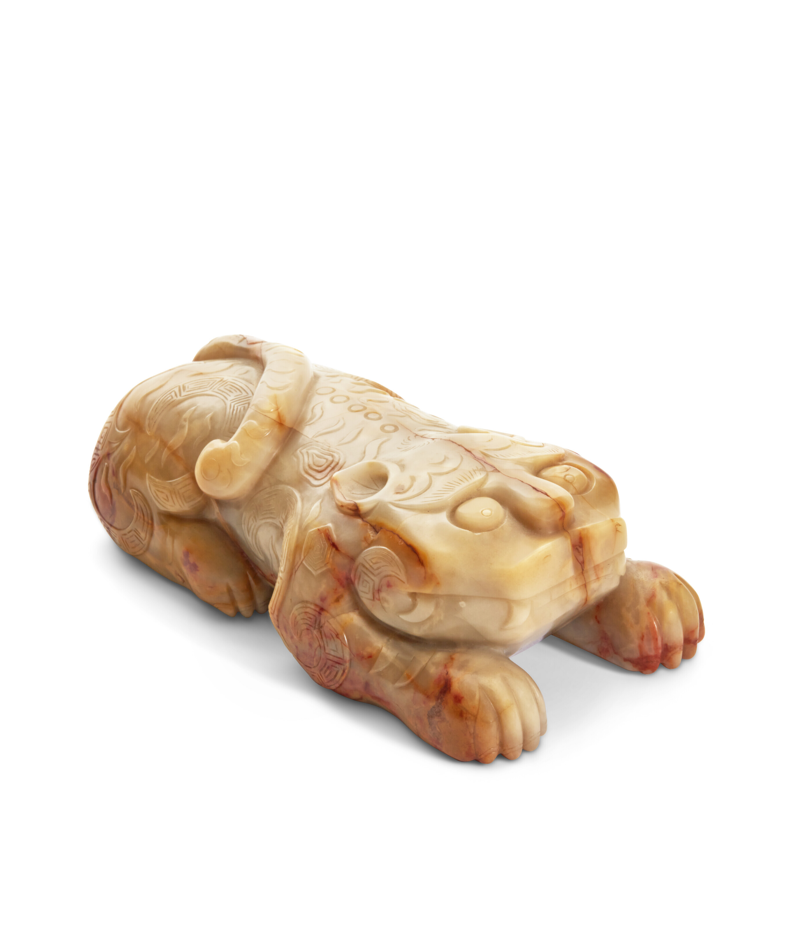 A BEIGE AND RUSSET JADE CARVING OF A BEAST, CHINA, MING DYNASTY (1368 ...