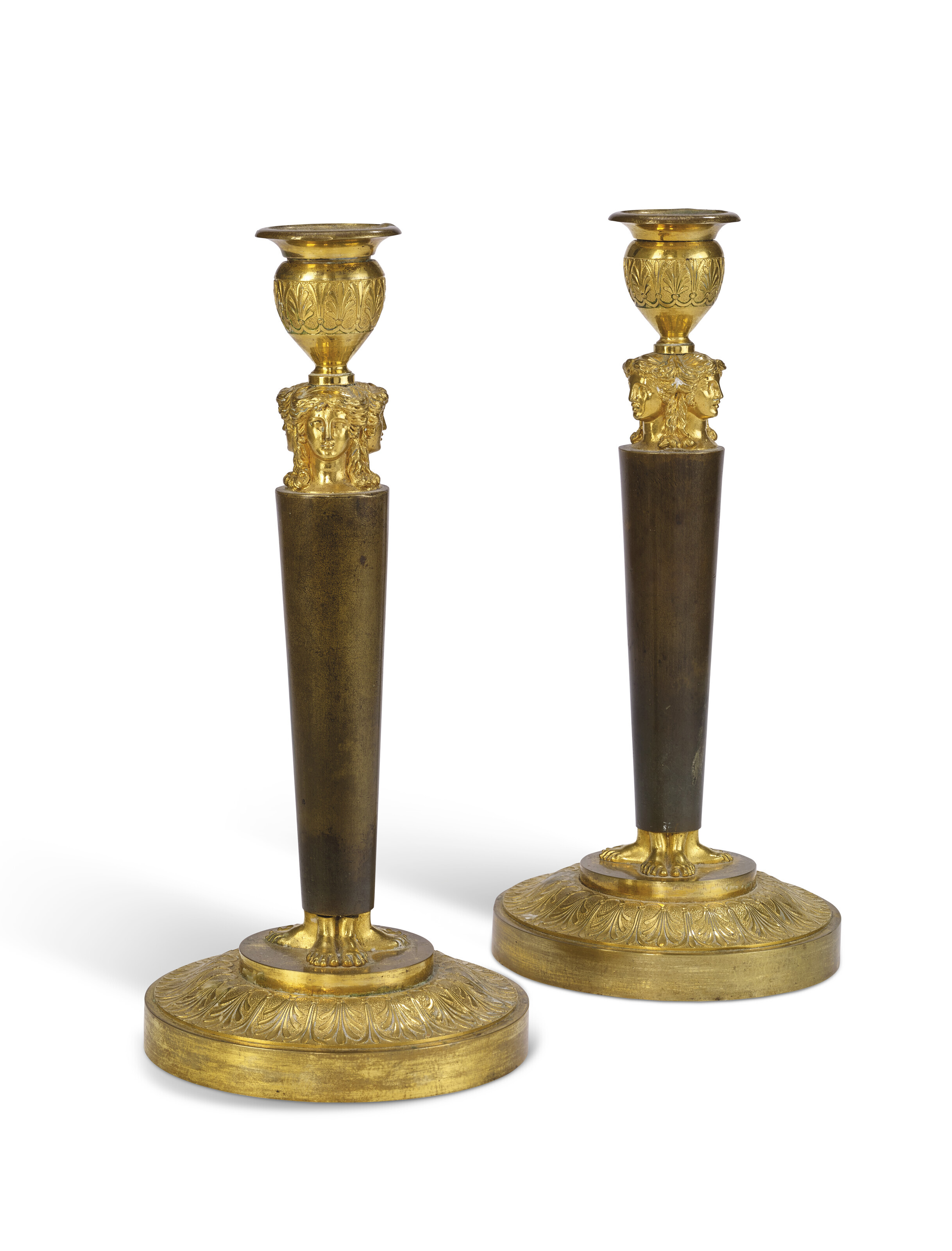 PAIRE DE FLAMBEAUX D'ÉPOQUE EMPIRE, DÉBUT DU XIXe SIÈCLE | Christie’s