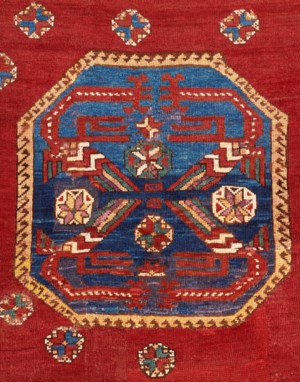 AN ANATOLIAN 'PHOENIX IN OCTAGON' RUG