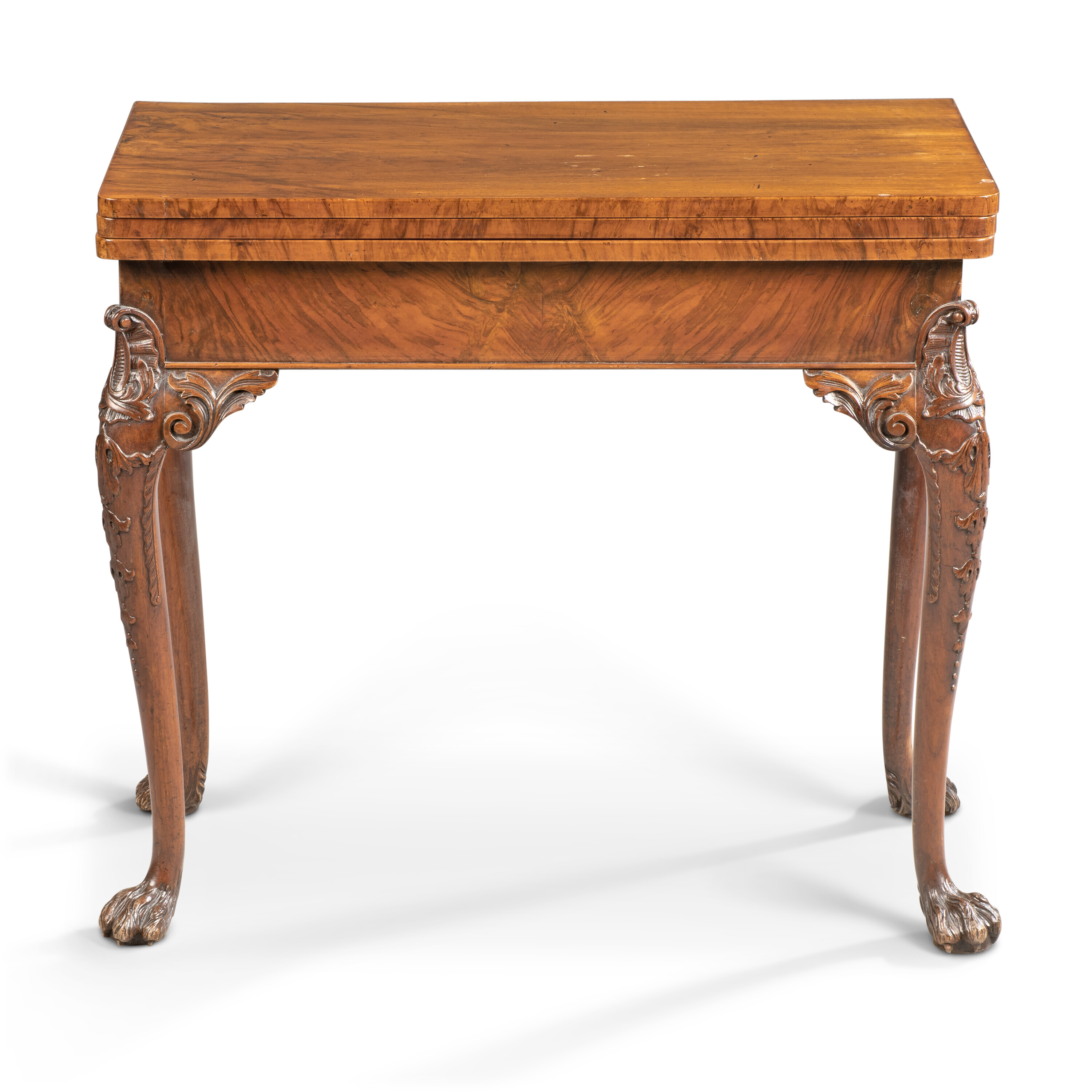 A GEORGE II WALNUT TRIPLE-FOLD GAMES TABLE, ATTRIBUTED TO GILES GRENDEY ...