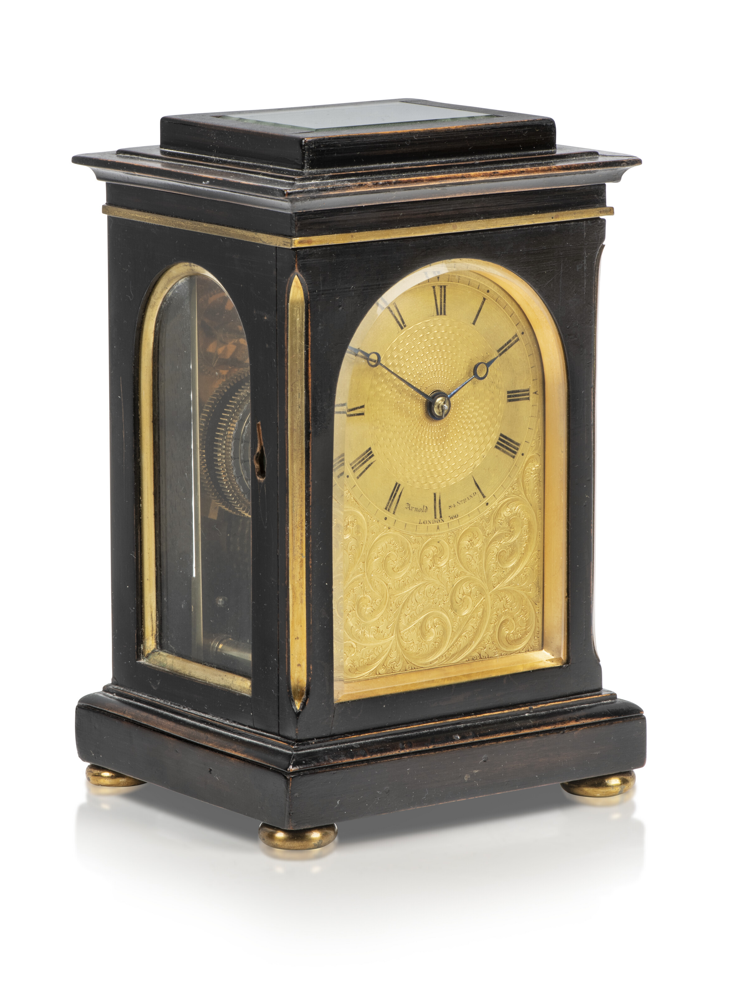 AN EARLY VICTORIAN EBONISED FRUITWOOD AND GILT-BRASS TIMEPIECE MANTEL ...